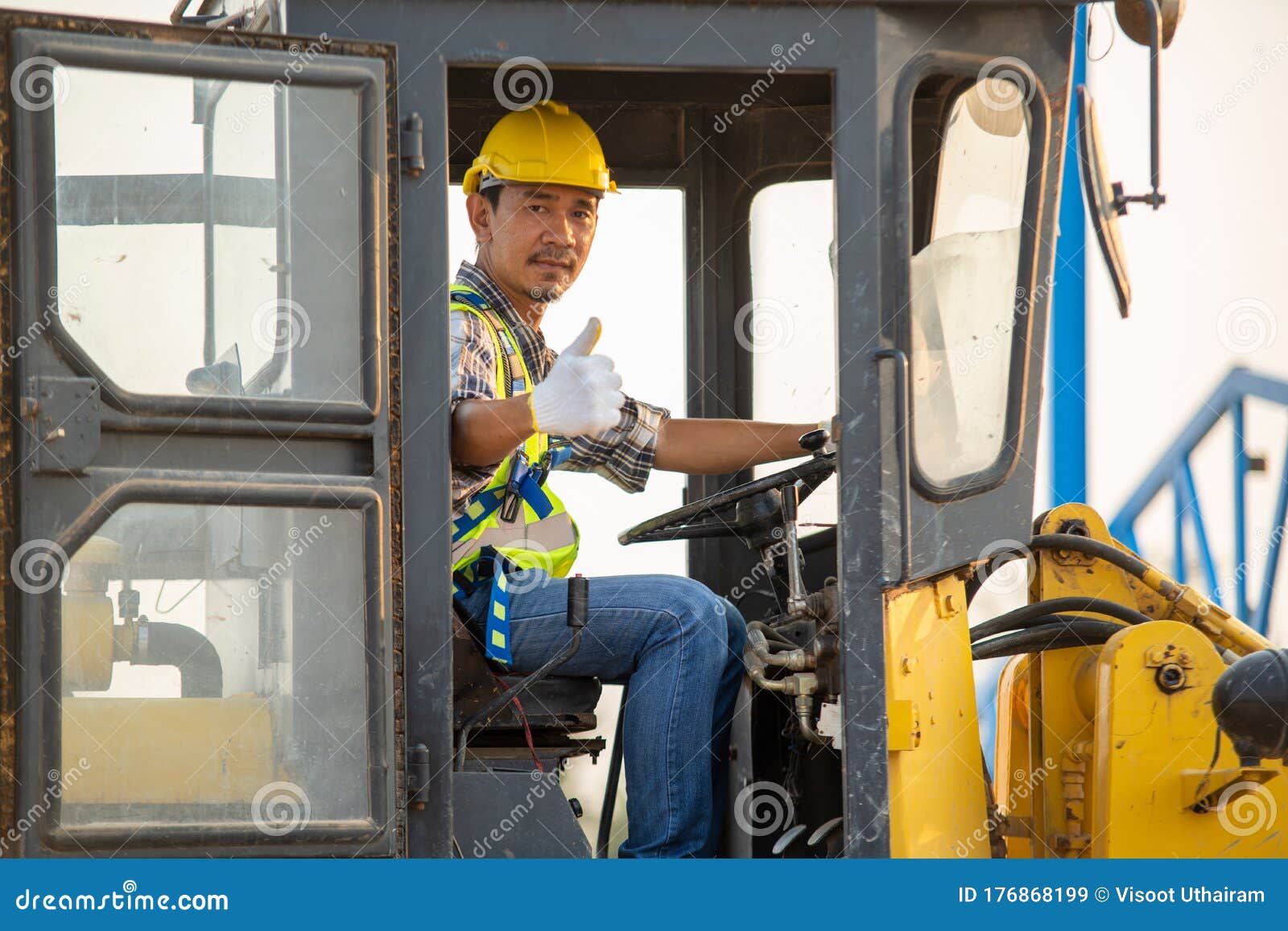 Engineer or Architect with White Helmet Driving Loader Truck at ...