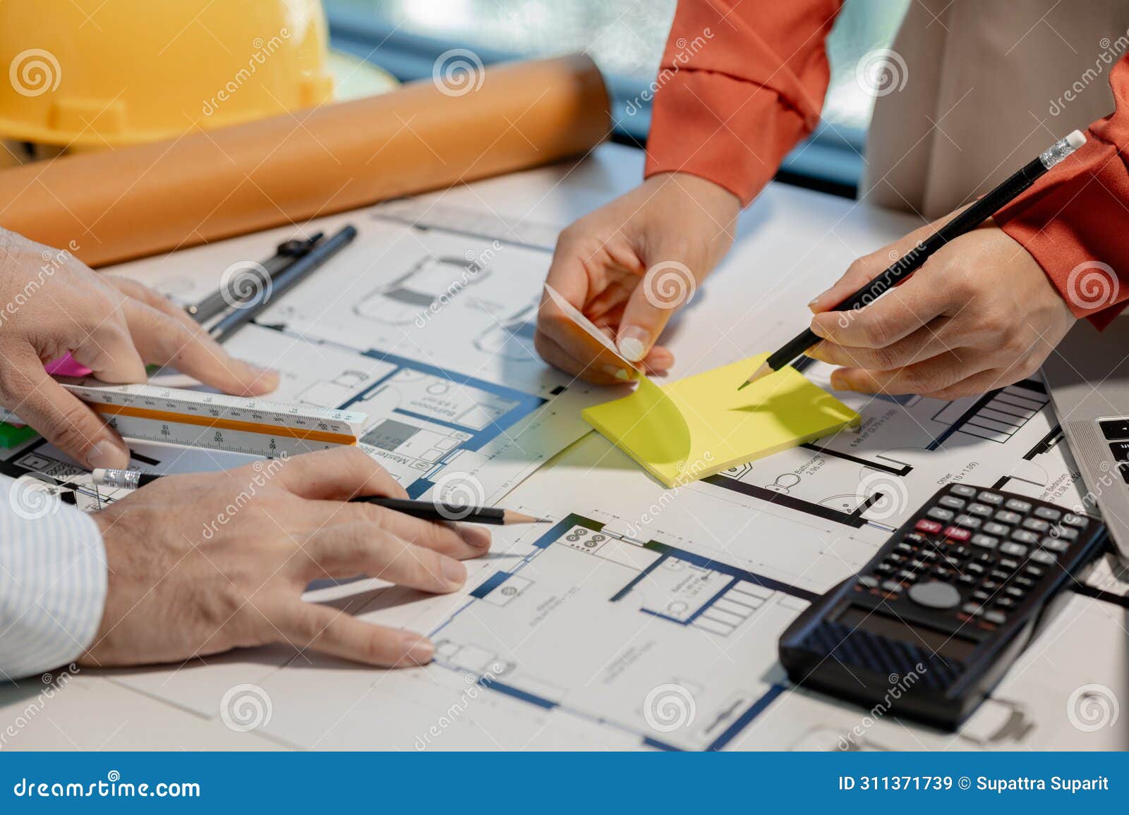 Engineer and Architect Work Together in the Office of a Construction ...