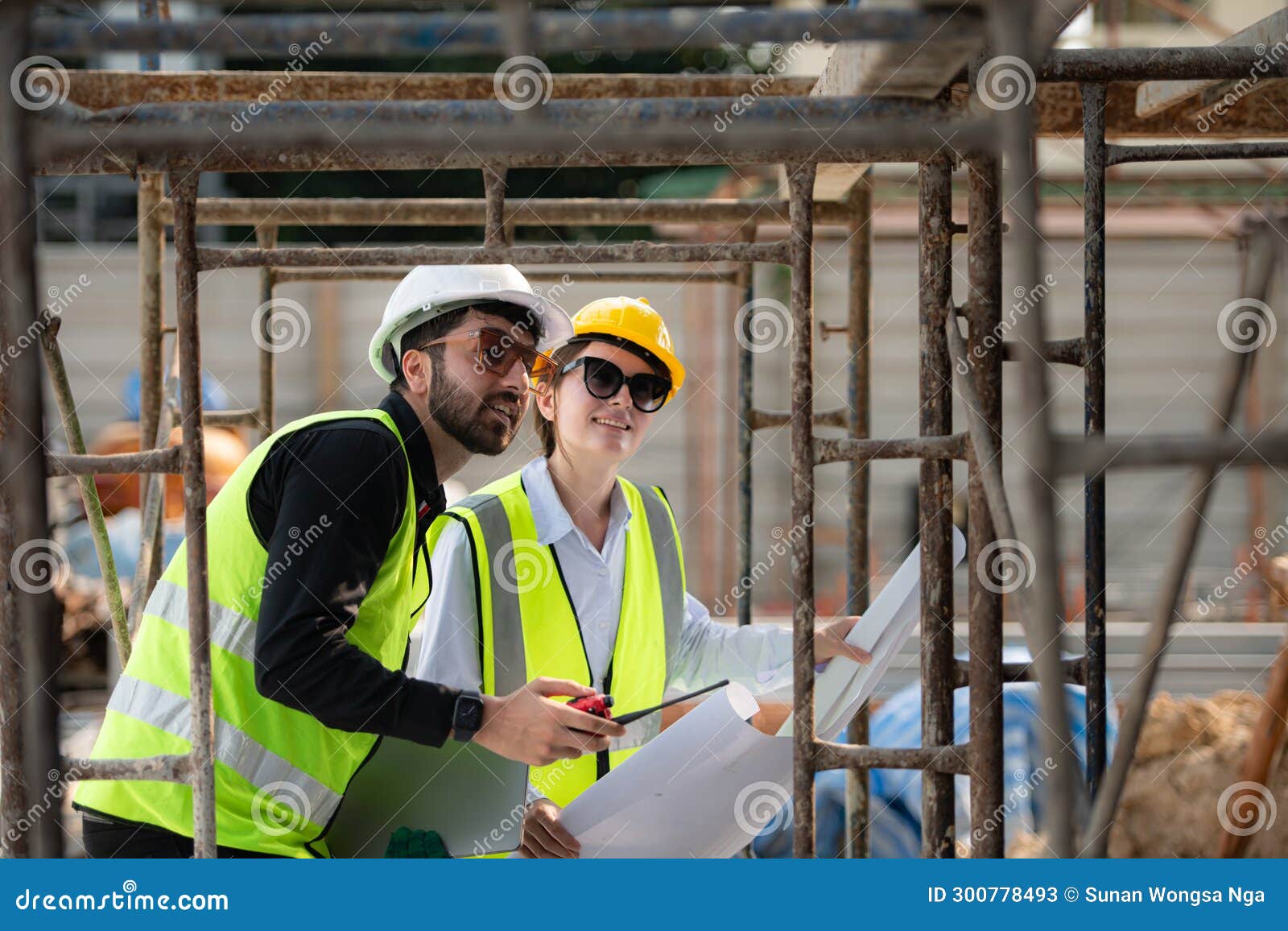 Engineer and Architect Working on the Construction Site, Double ...