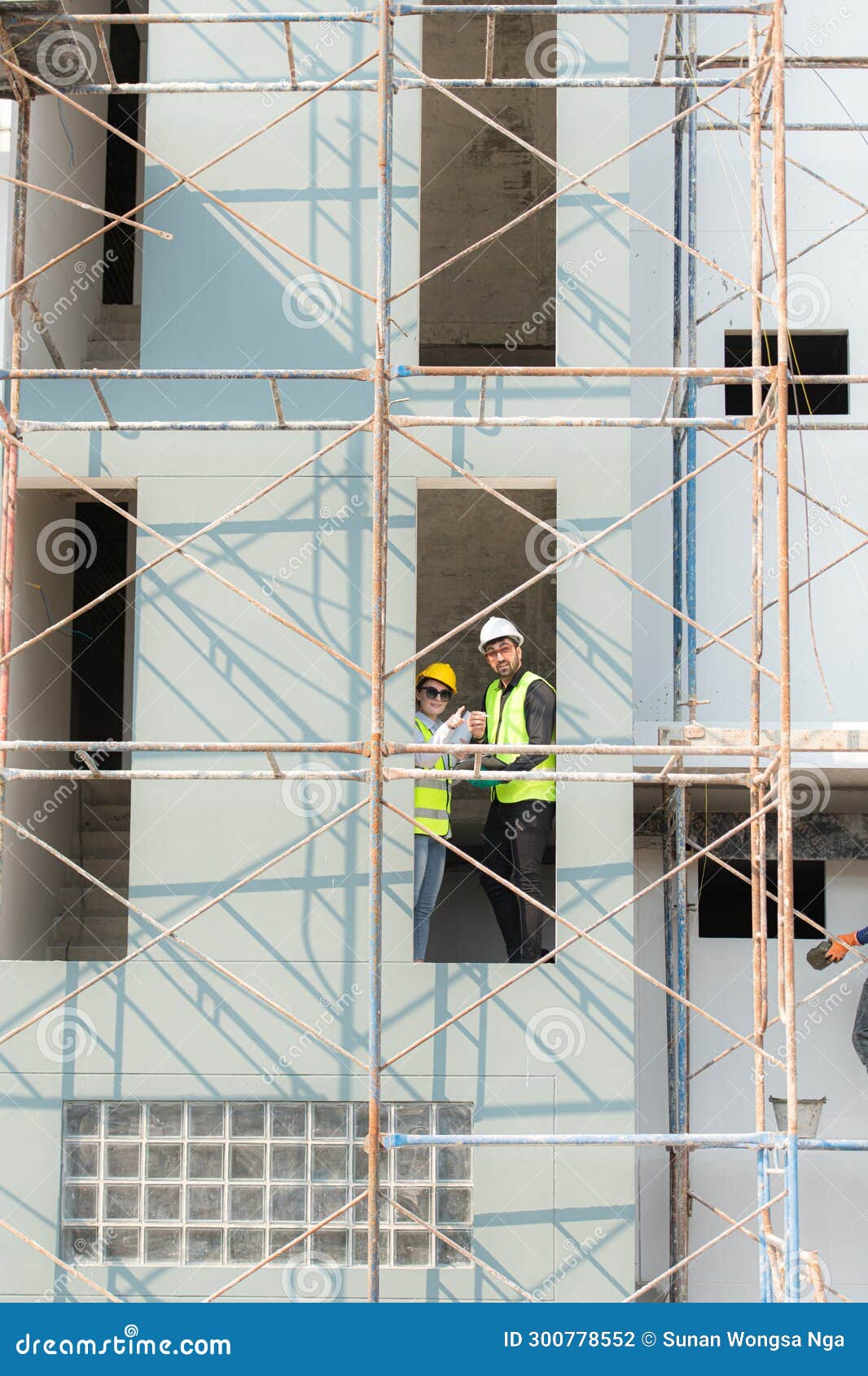 Engineer and Architect Working on the Construction Site, Double ...