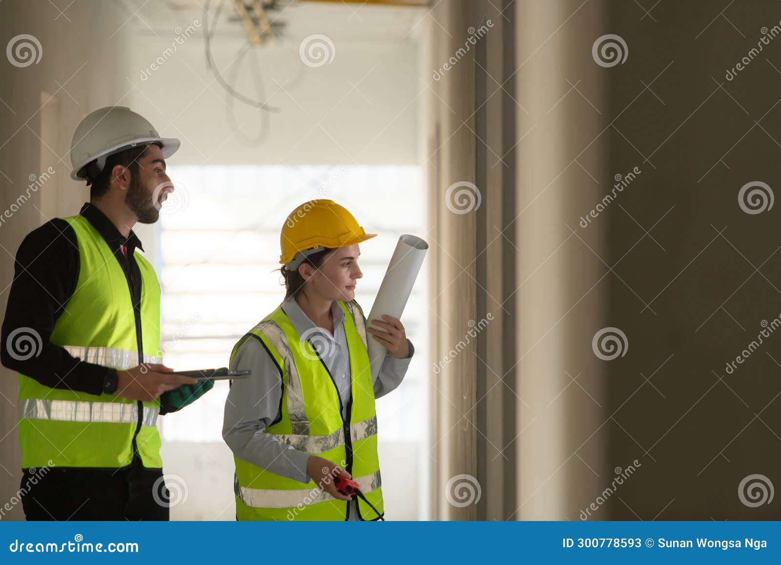 Engineer and Architect Working on the Construction Site, Double ...