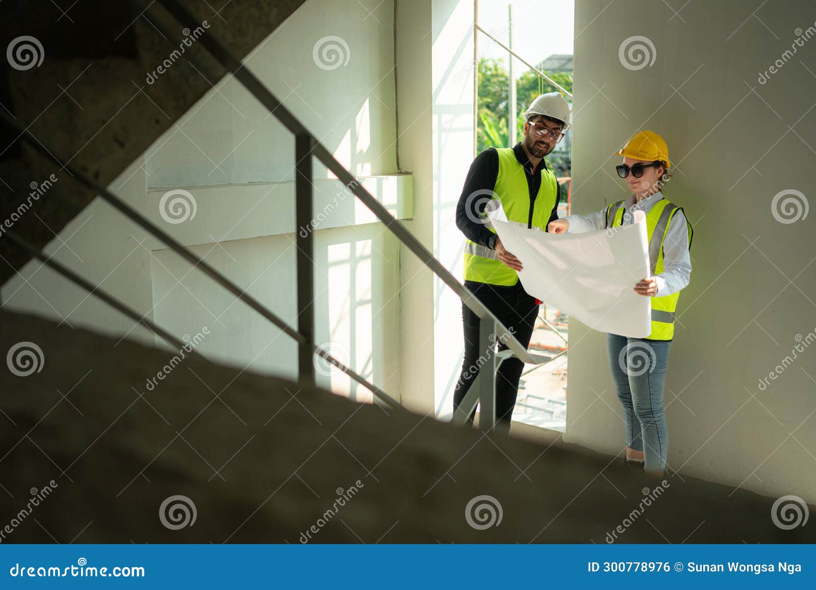 Engineer and Architect Working on the Construction Site, Double ...