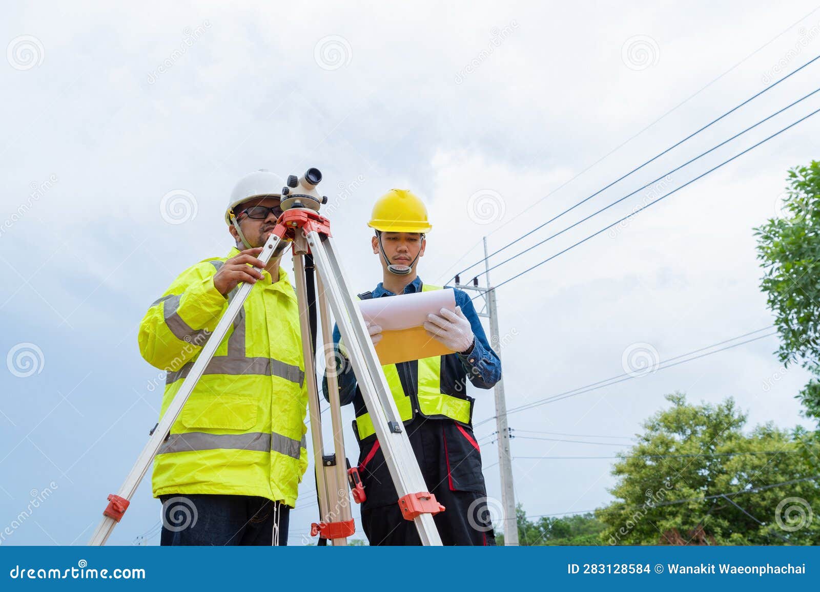 Asian Contractor Plan Together on Site To Work on a Rural Highway Stock ...