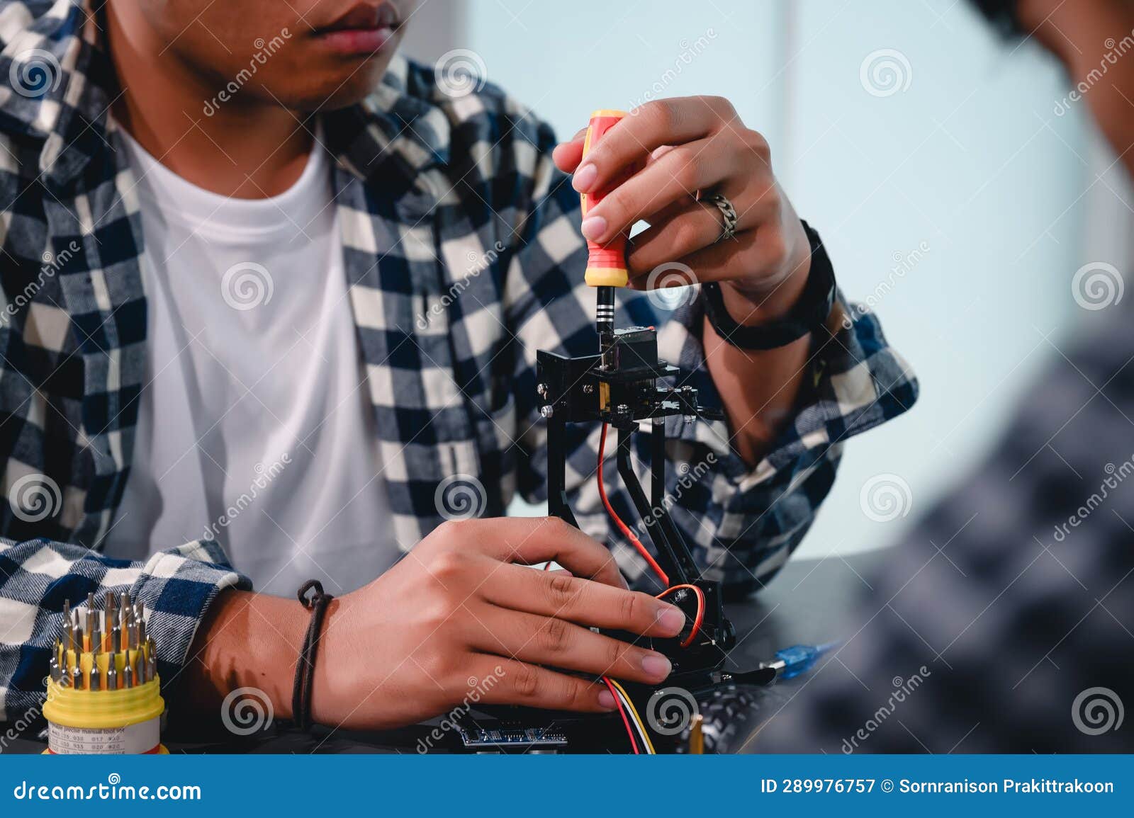 Engineer Asian Students Assembling Robotics Kits. Learning Mechanical Control, Robotics Combines ...