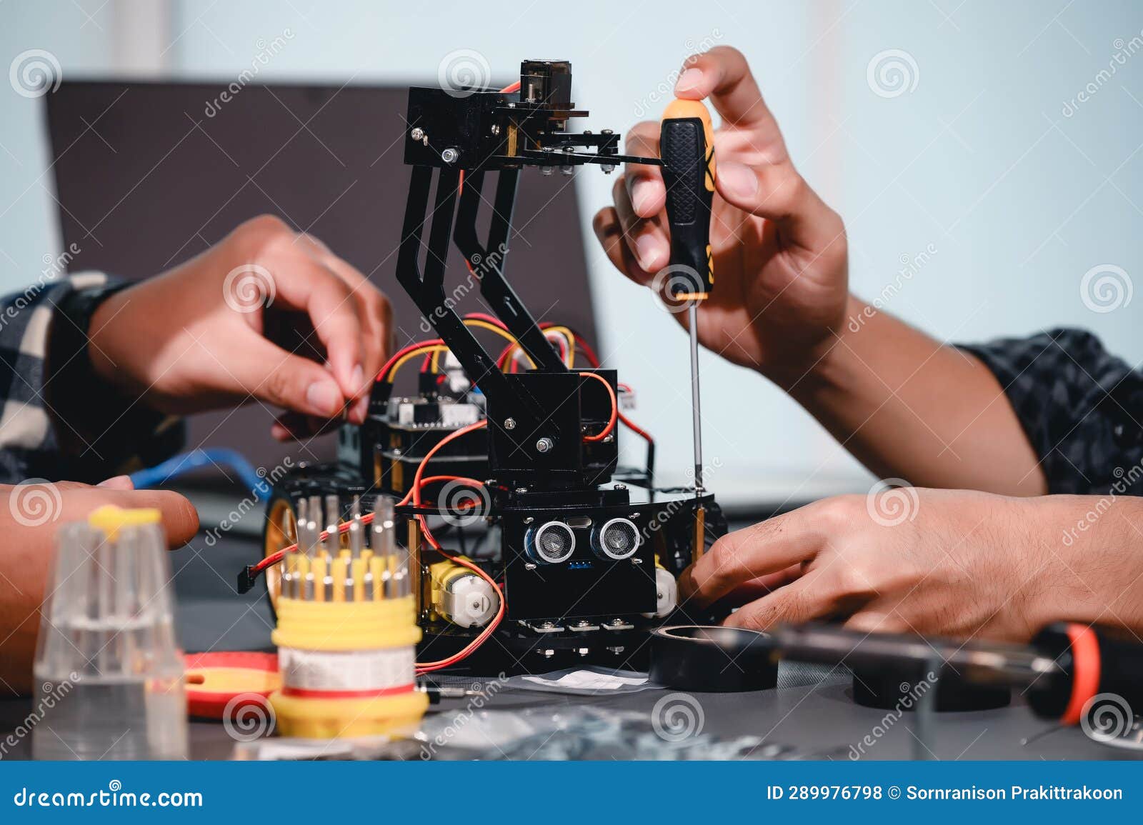 Engineer Asian Students Assembling Robotics Kits. Learning Mechanical Control, Robotics Combines ...