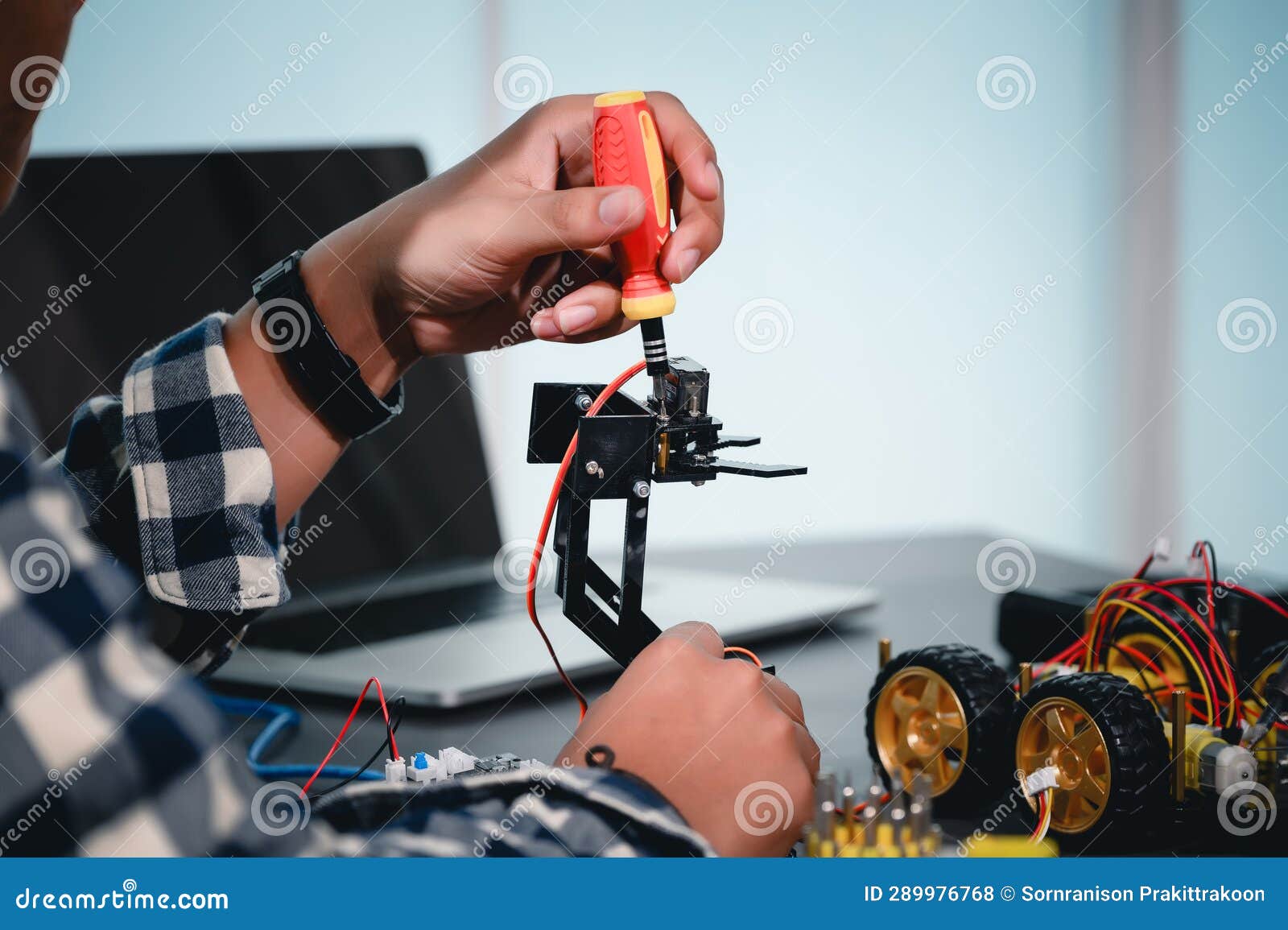 Engineer Asian Students Assembling Robotics Kits. Learning Mechanical Control, Robotics Combines ...