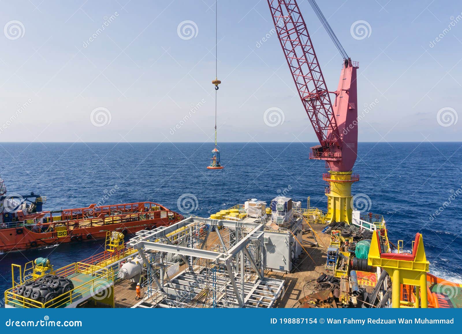 Offshore Pedestal Crane Doing Lifting Activities Onboard Offshore ...