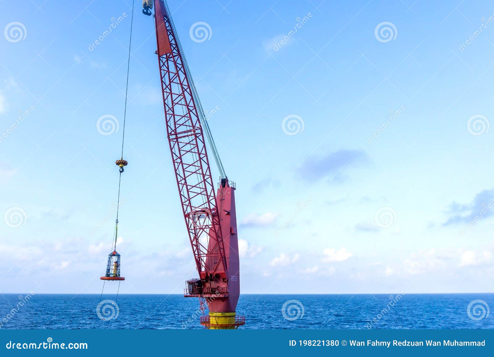 An Engineer Being Transferred From A Boat To A Construction Work Barge ...