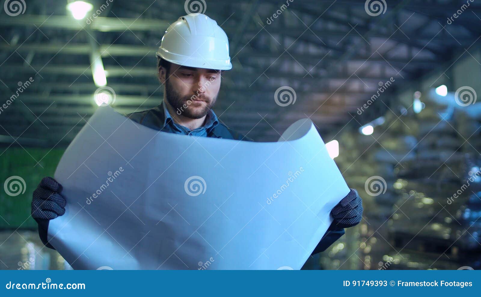 An engineer with blueprint stock image. Image of cheerful - 91749393