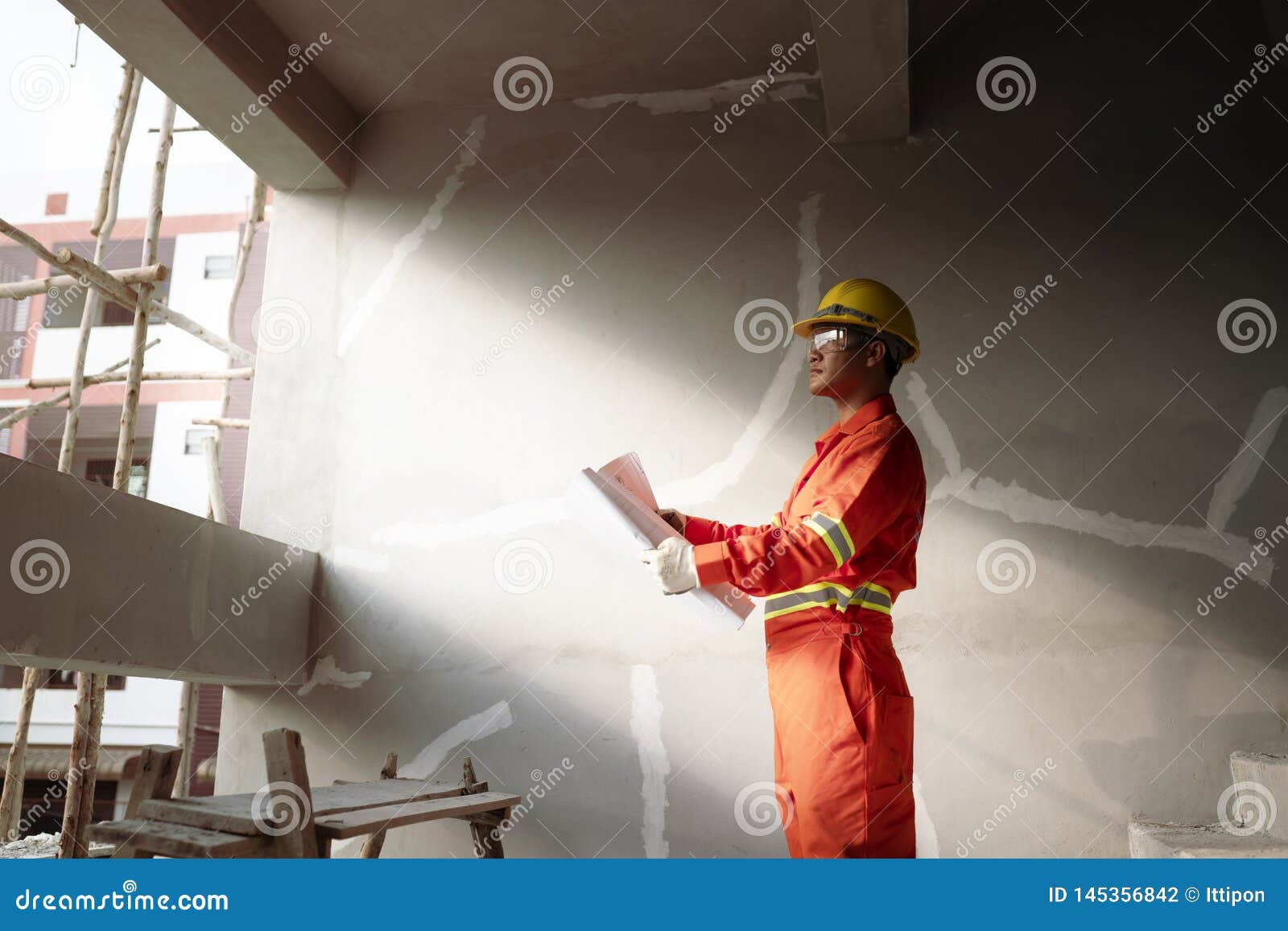 Engineer with blueprint stock photo. Image of engineering - 145356842