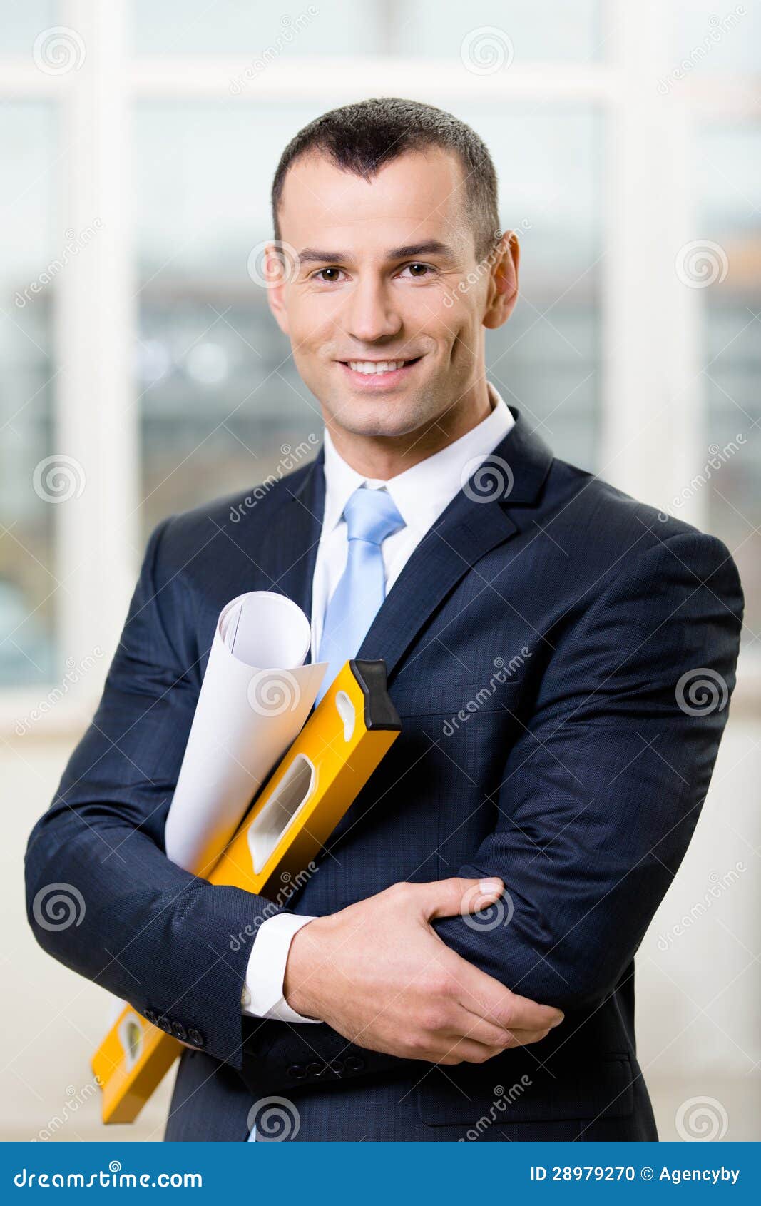 Engineer with Blueprint and Level Stock Photo - Image of contractor ...