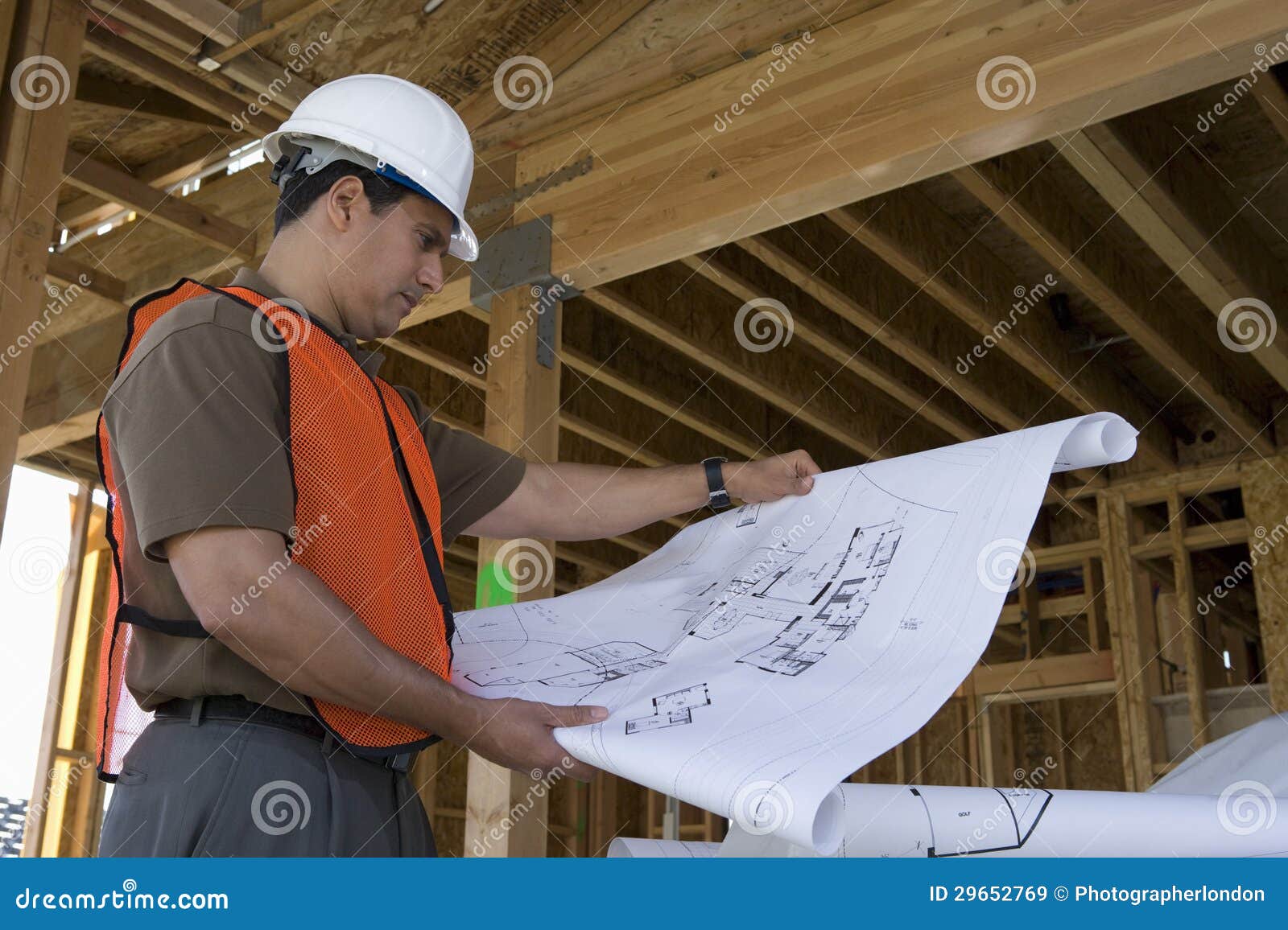 Engineer with Blueprint at Site Stock Image - Image of engineer ...