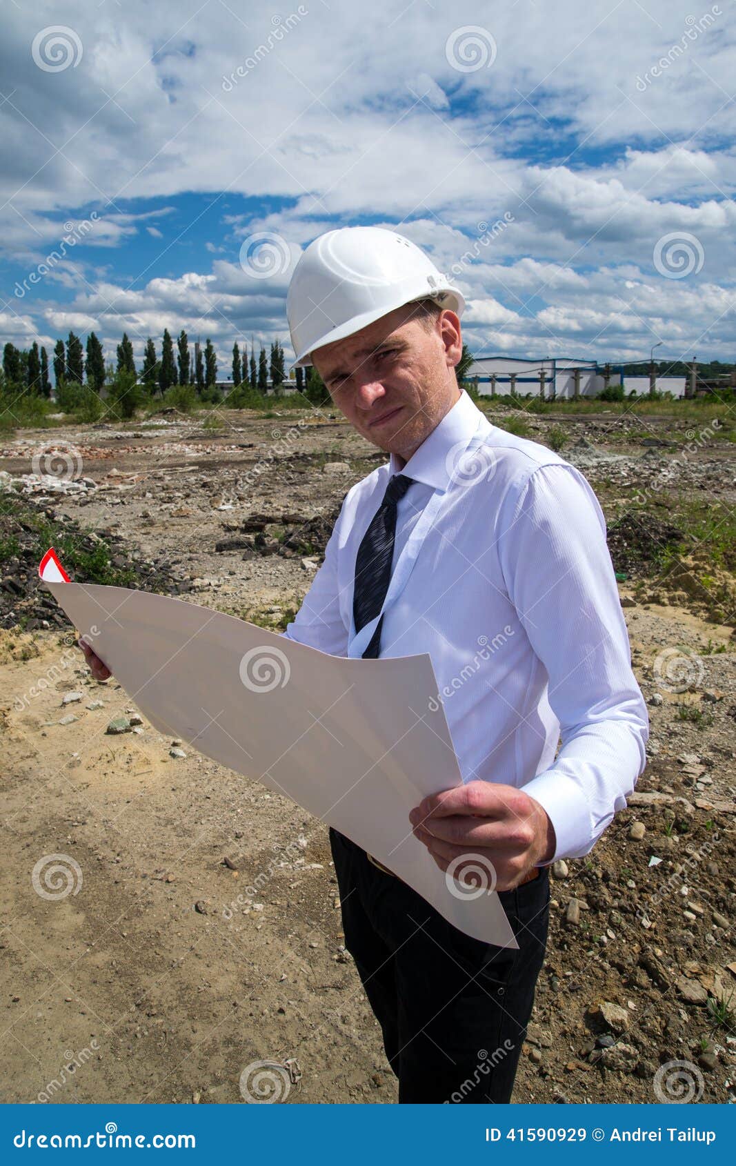 Engineer with Blueprints on Site Stock Image - Image of equipment ...