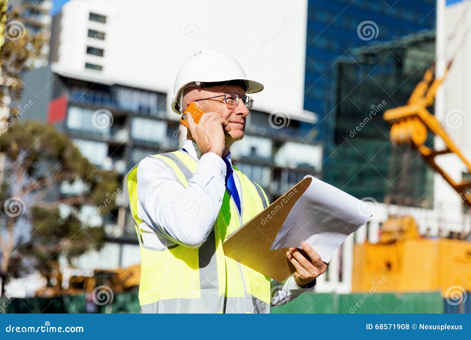 Engineer Builder at Construction Site Stock Photo - Image of drawing ...