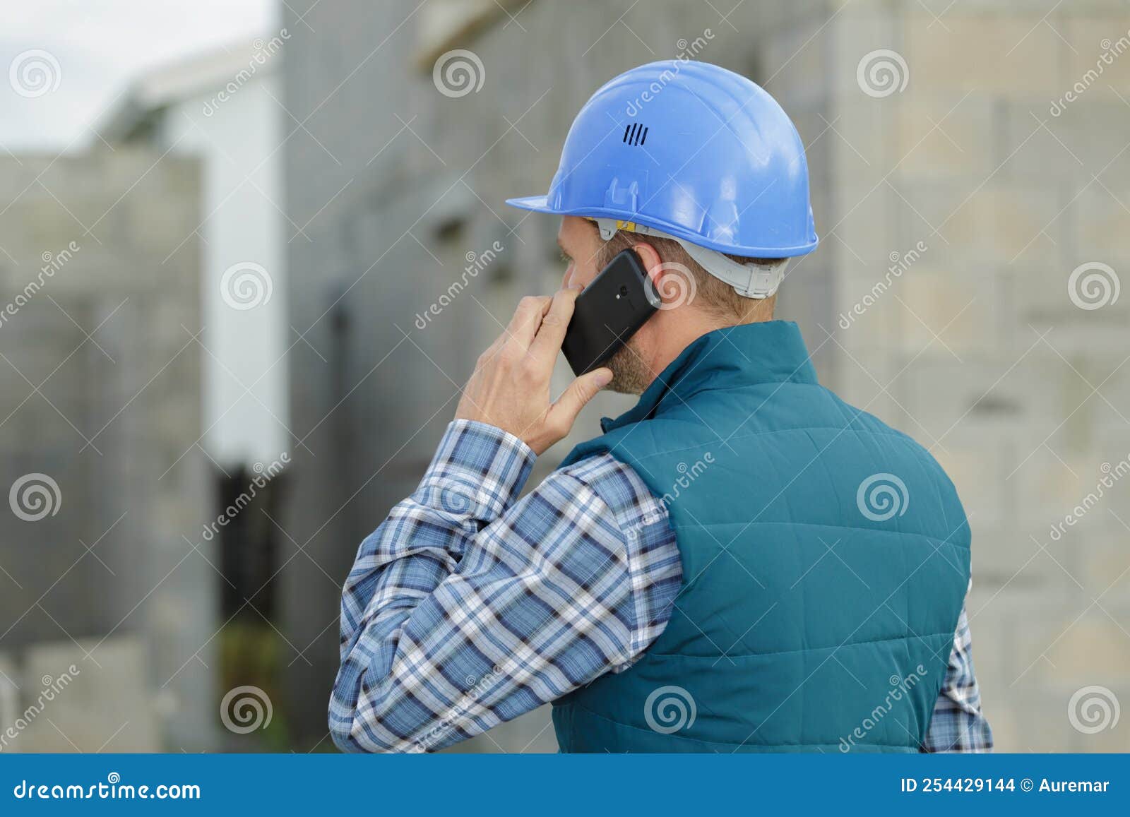 Engineer Builder on Phone Outside Construction Site Stock Photo - Image ...