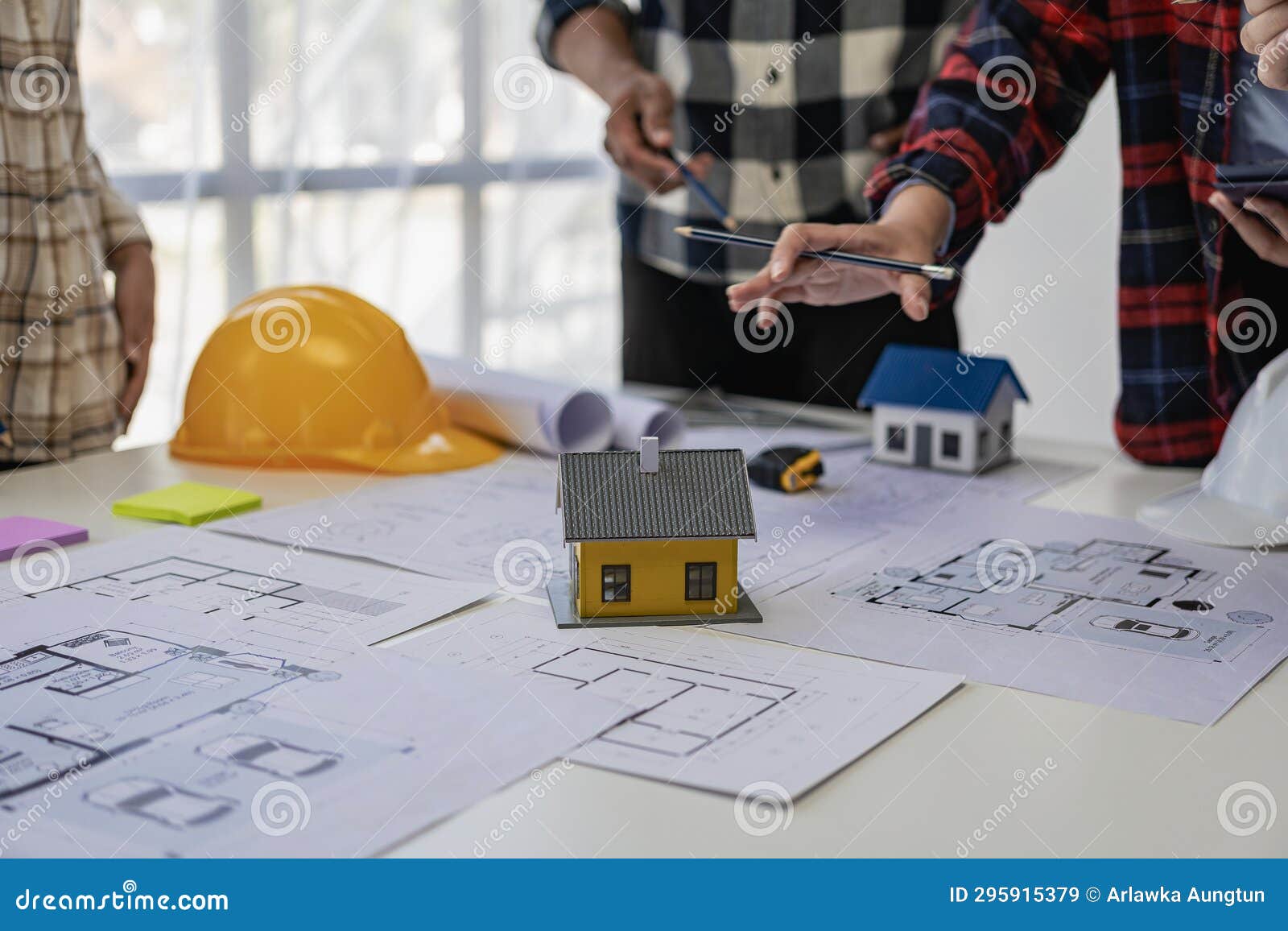 Engineer and Businessman Discussing Construction Project in Office ...