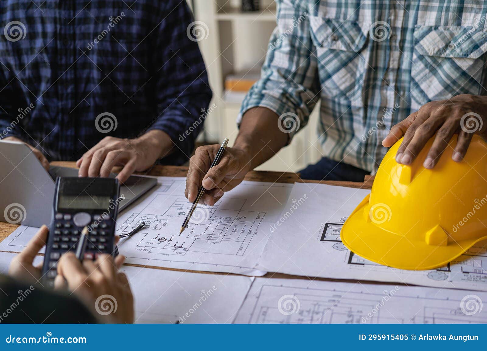 Engineer and Businessman Discussing Construction Project in Office ...
