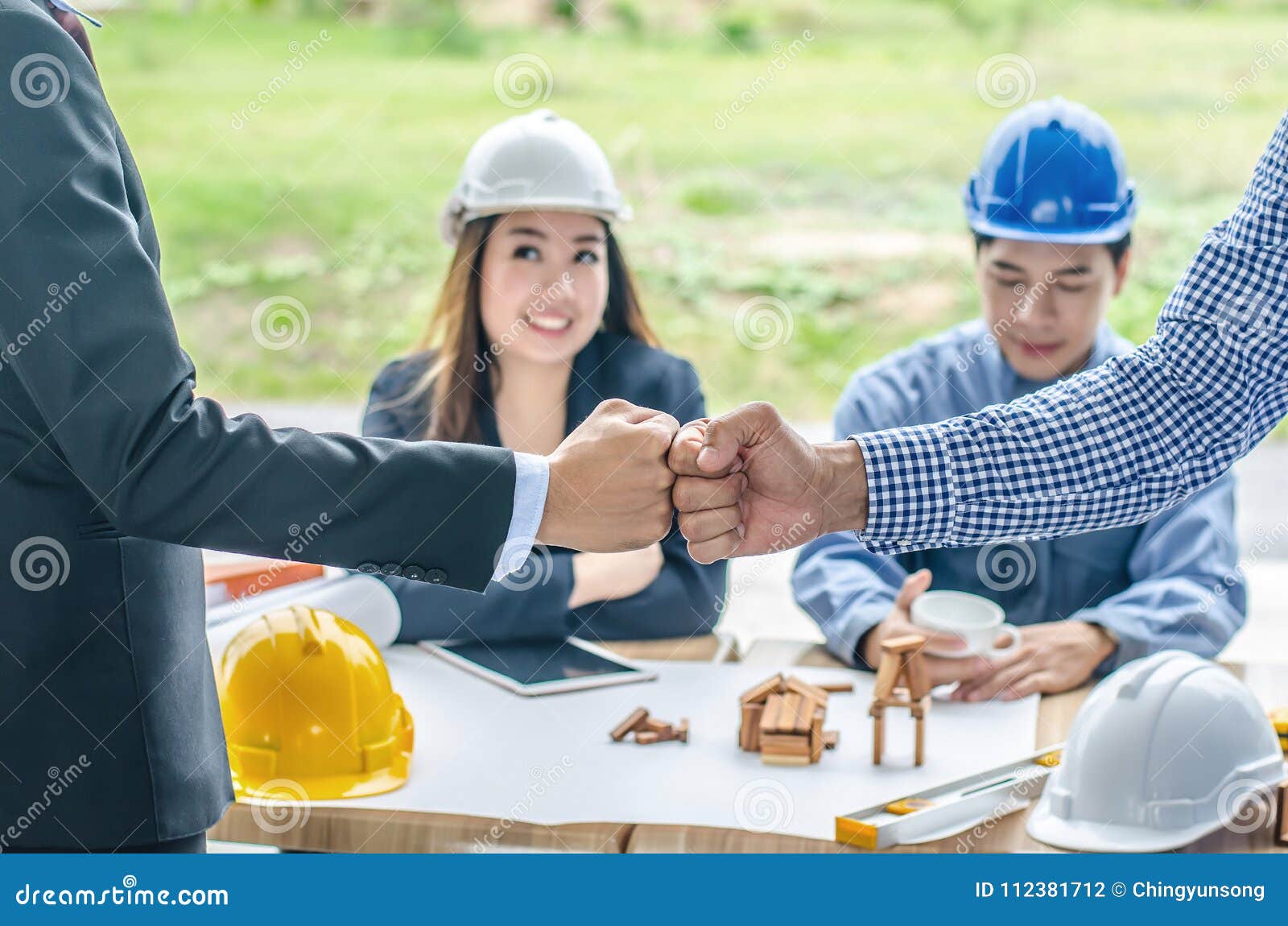 Engineer and Businessman Handshake, Teamwork between Professional ... Engineer and Businessman Handshake, Teamwork between Professional ...