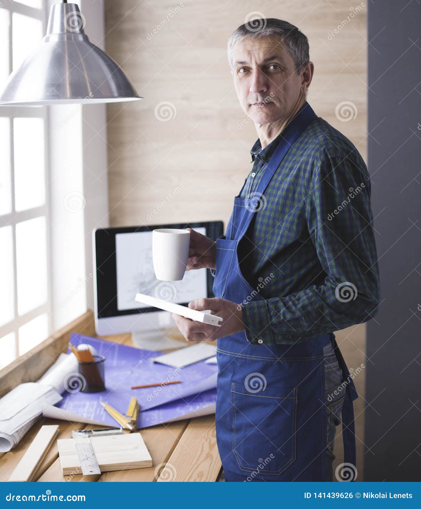 Engineer Carpenter Working on Laptop and Sketching Project Stock Photo ...