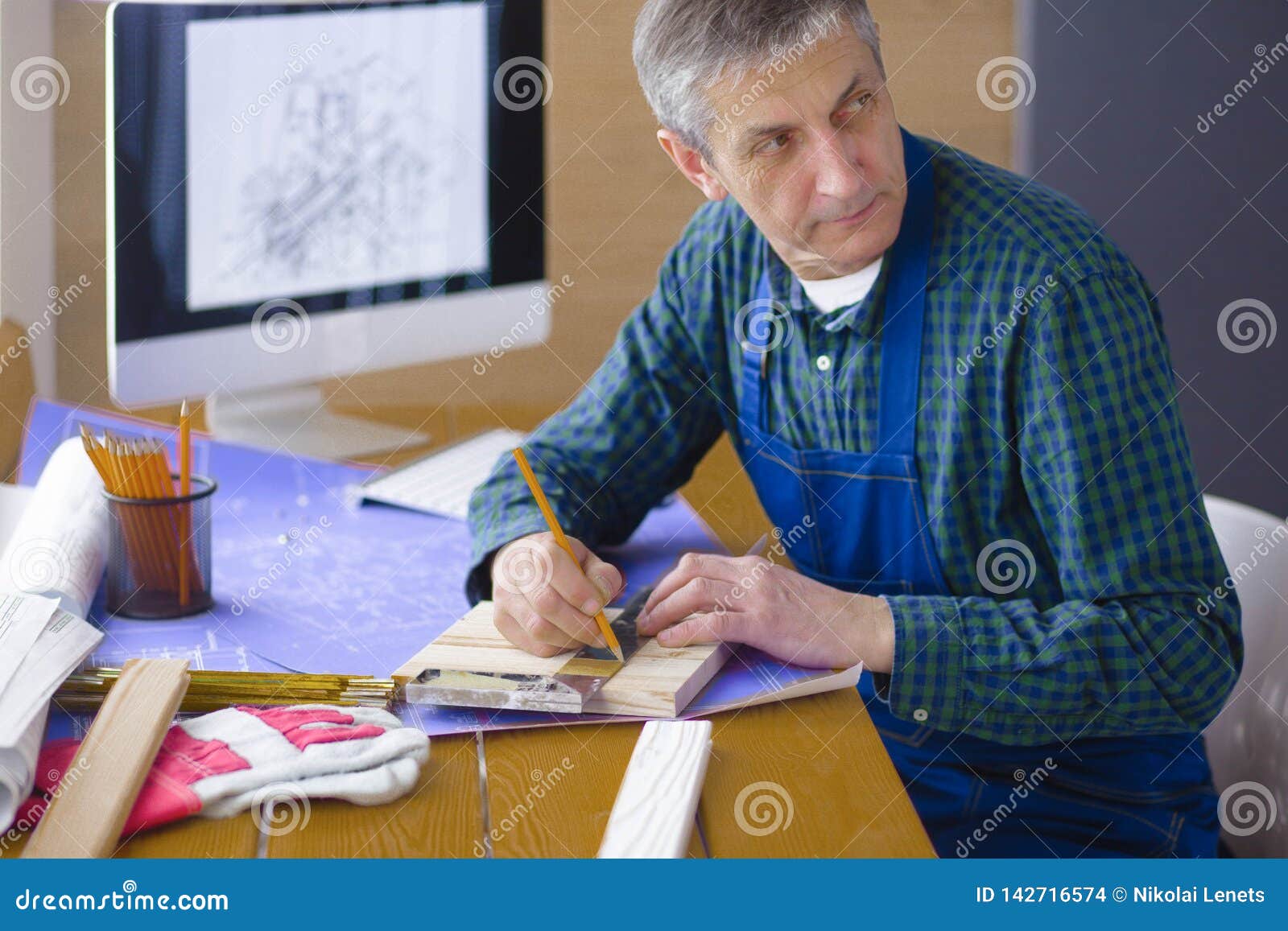 Engineer Carpenter Working on Laptop and Sketching Project Stock Photo ...