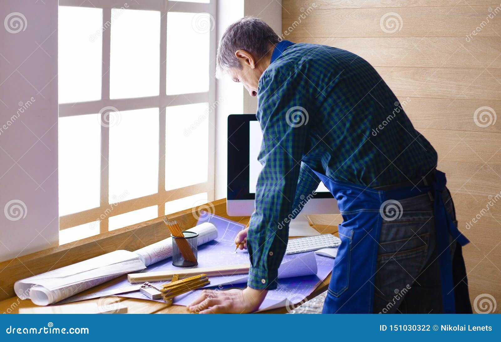Engineer Carpenter Working on Laptop and Sketching Project Stock Photo ...