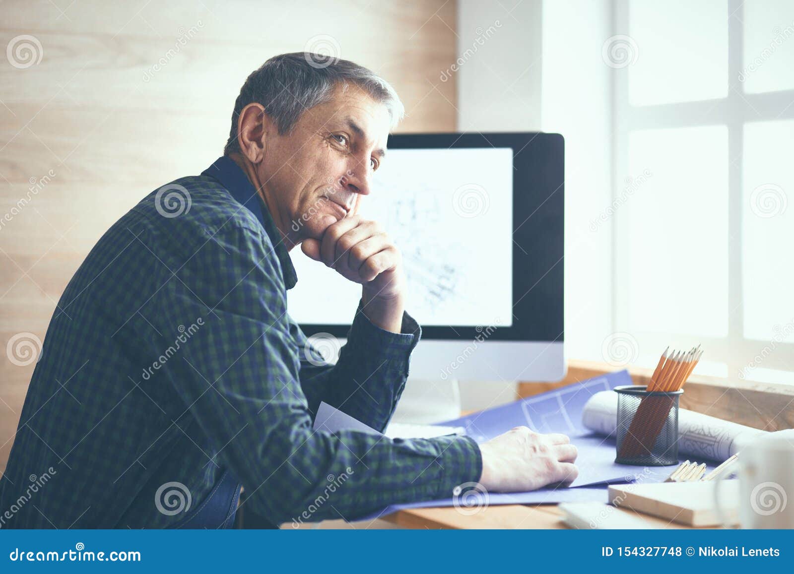 Engineer Carpenter Working on Laptop and Sketching Project Stock Photo ...