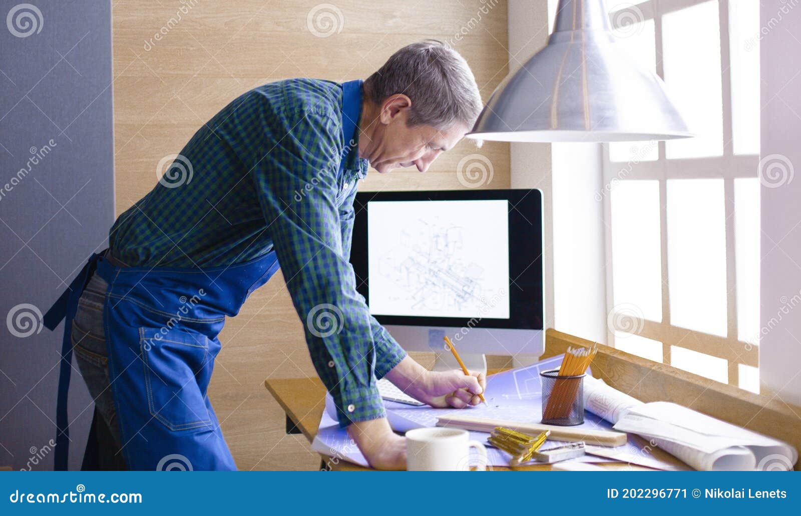 Engineer Carpenter Working on Laptop and Sketching Project Stock Image ...