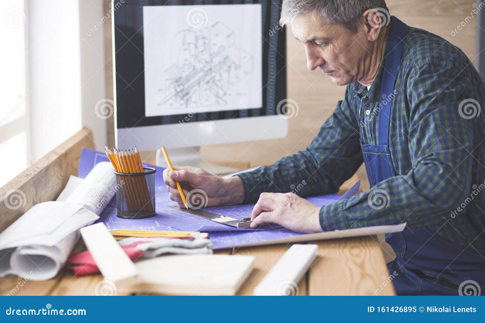 Engineer Carpenter Working on Laptop and Sketching Project Stock Image ...