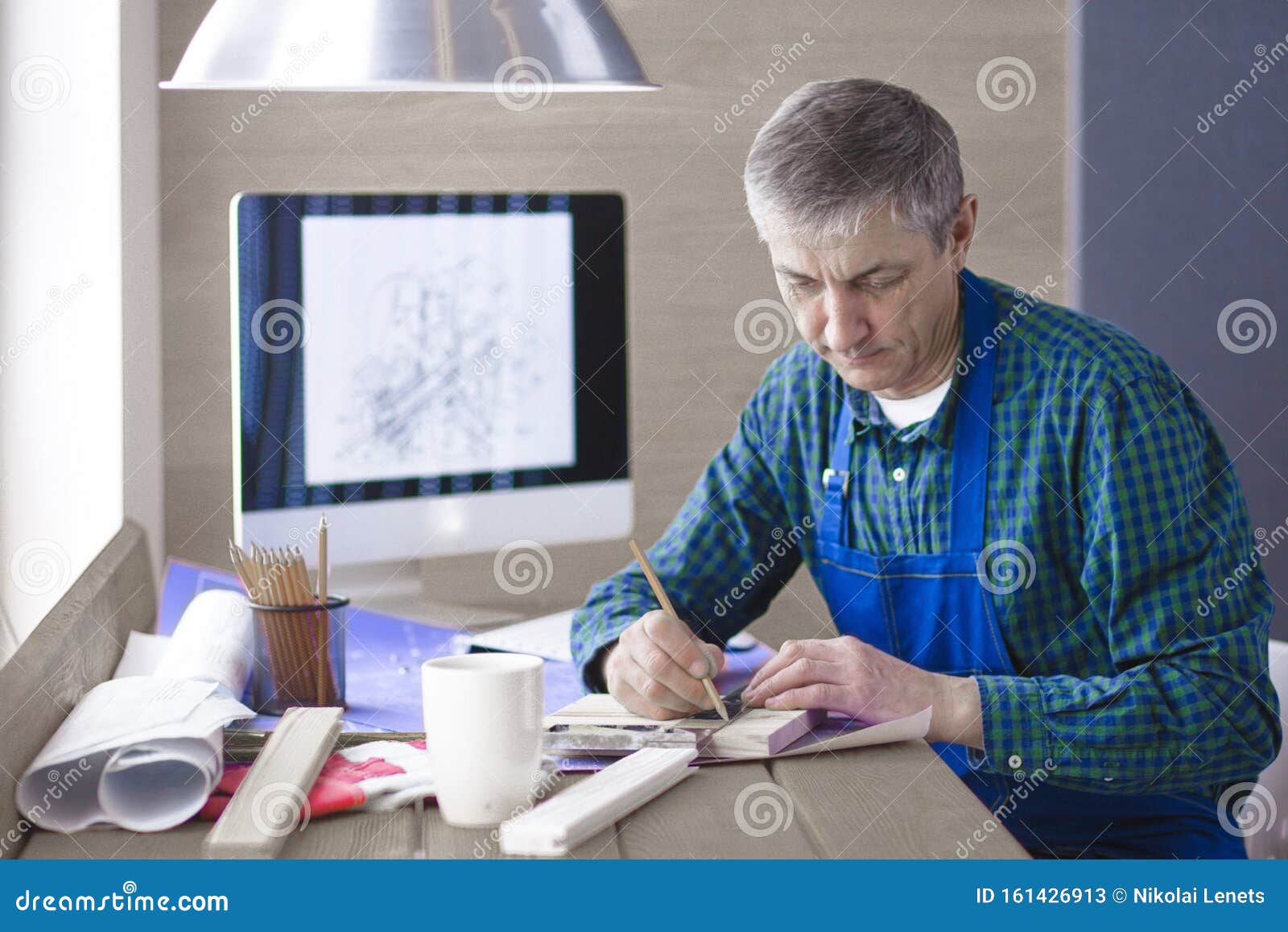 Engineer Carpenter Working on Laptop and Sketching Project Stock Image ...