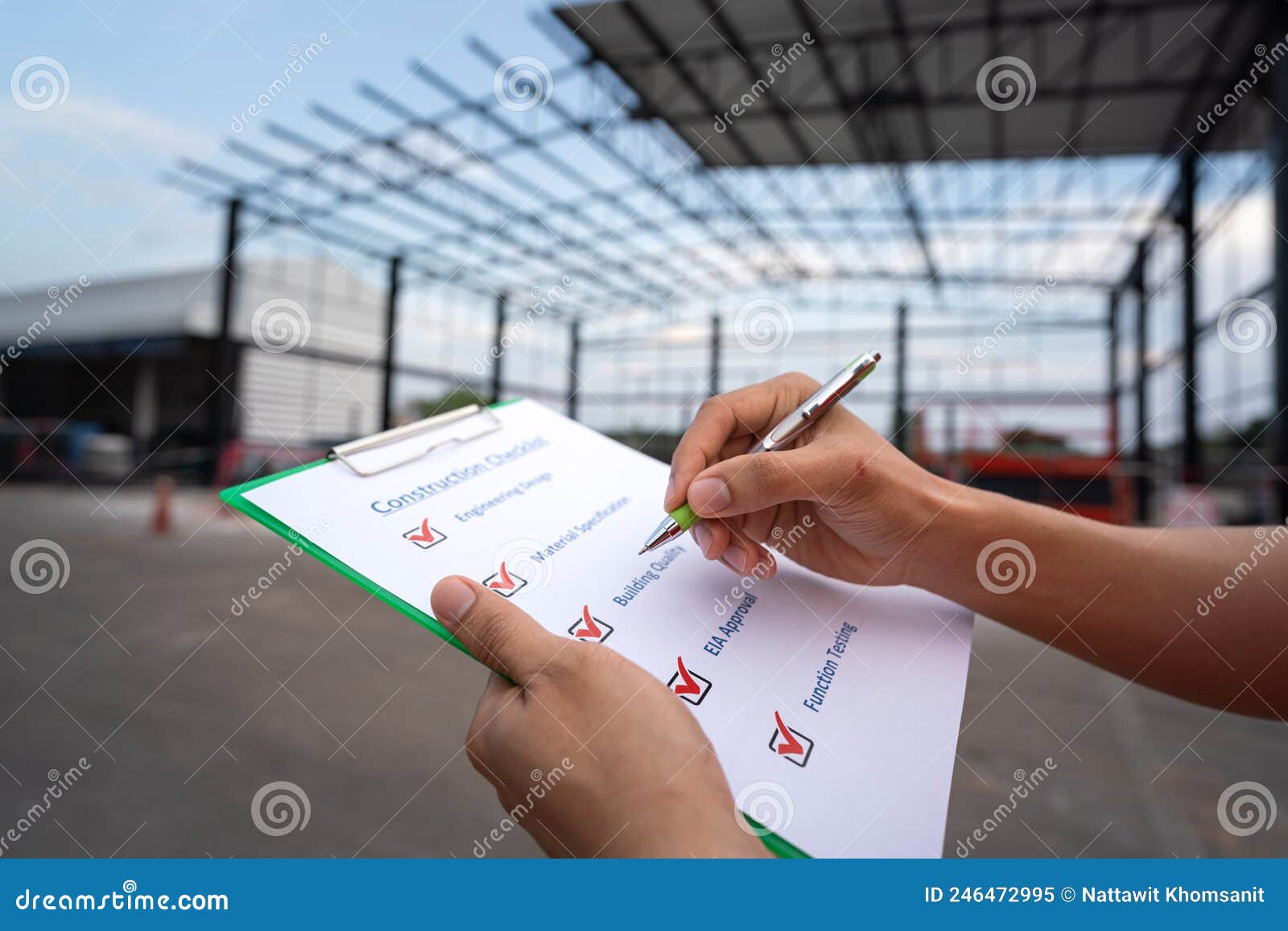 An Engineer is Checking Construction Quality on the Paperwork. Stock ...