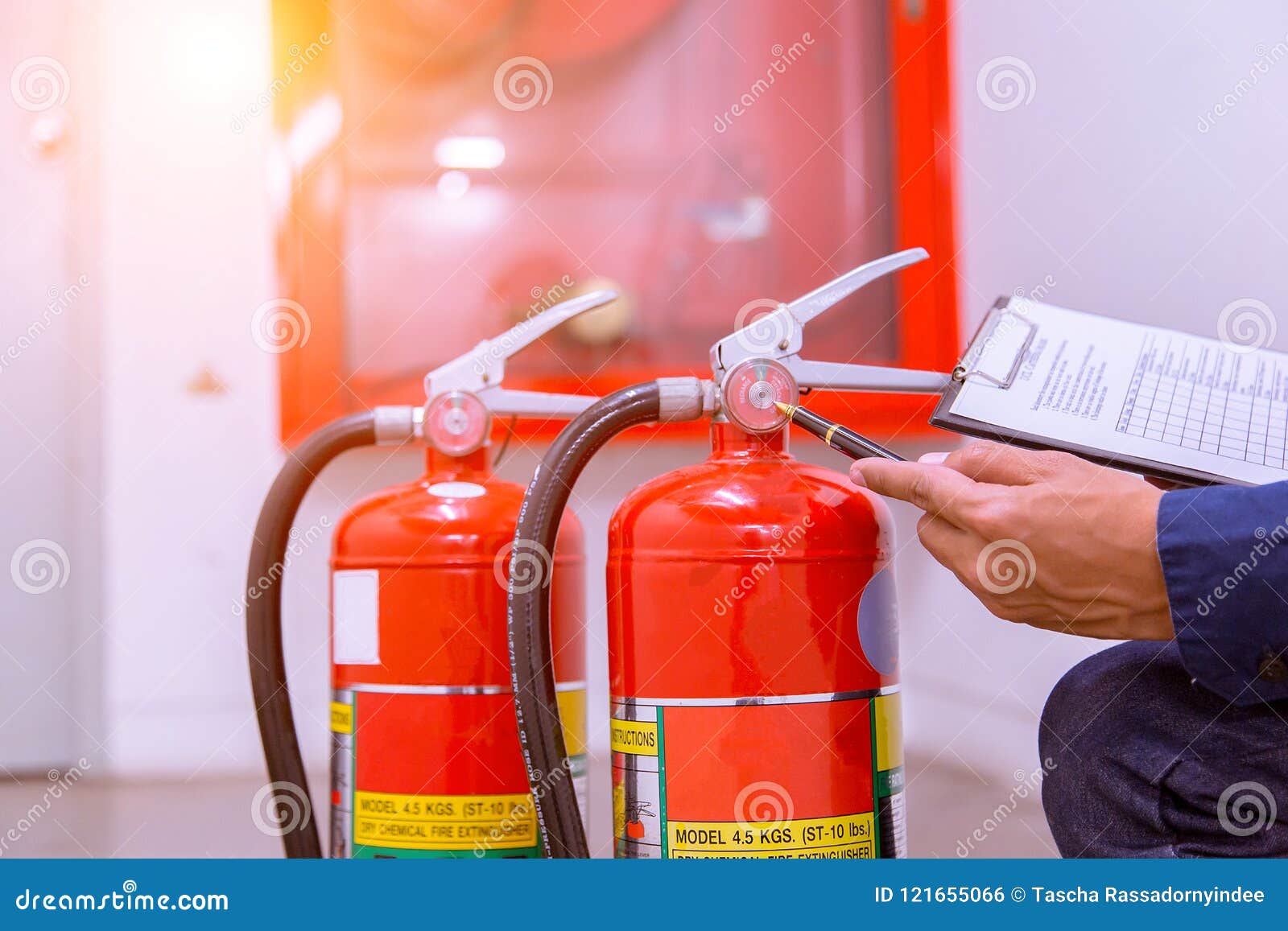 Engineer Checking Fire Extinguisher. Stock Photo - Image of checking ...