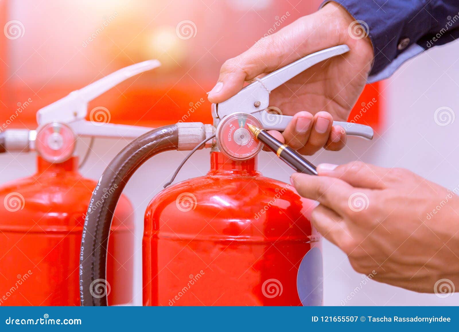 Engineer Checking Fire Extinguisher. Stock Image - Image of engineer ...