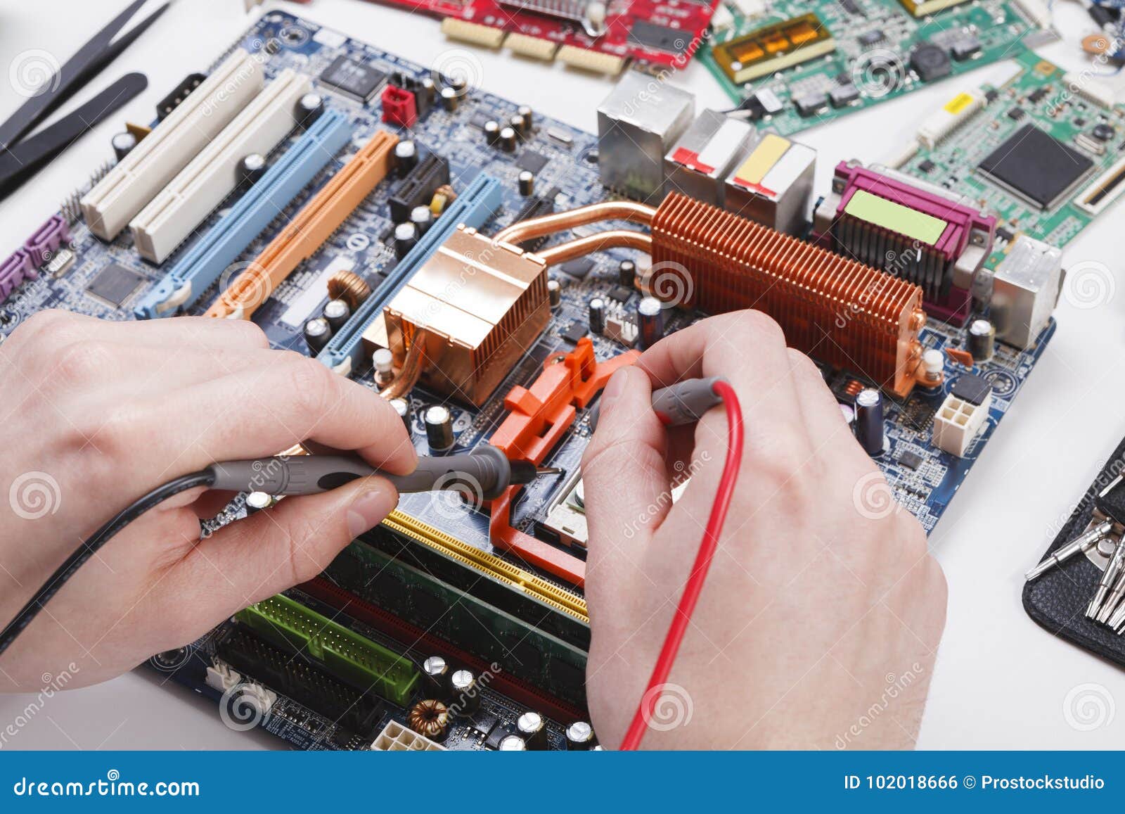 Engineer Checking Motherboard with Multimeter Stock Photo - Image of ...