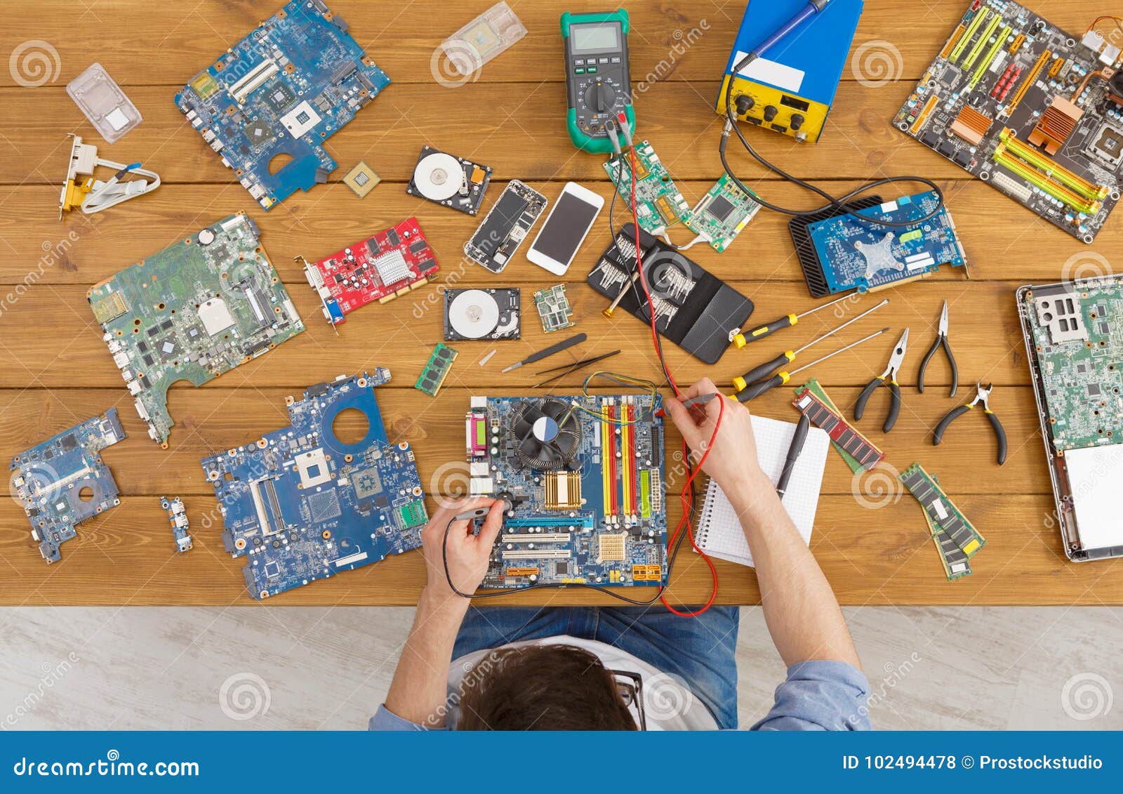 Engineer Checking Motherboard with Multimeter Stock Photo - Image of ...