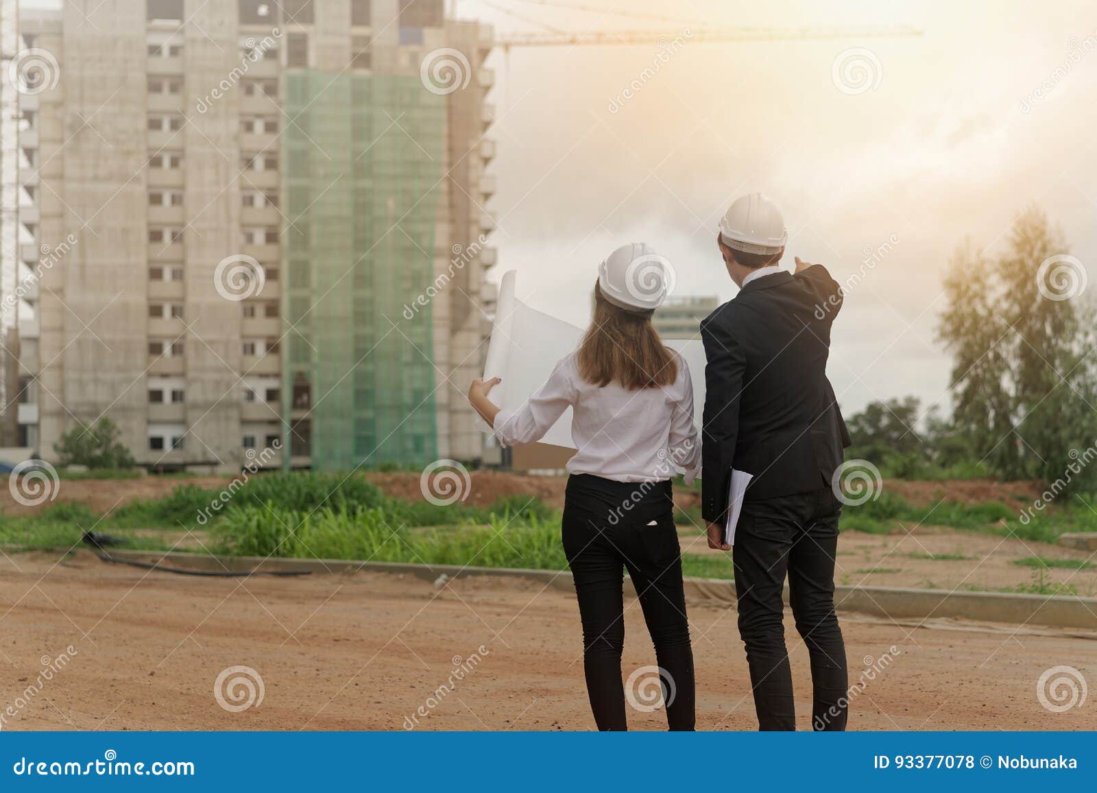 Engineer Checking Plan on Building Site. Stock Photo - Image of ...