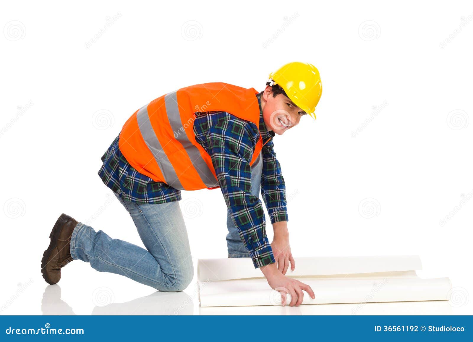 Engineer checking plan. stock photo. Image of helmet - 36561192