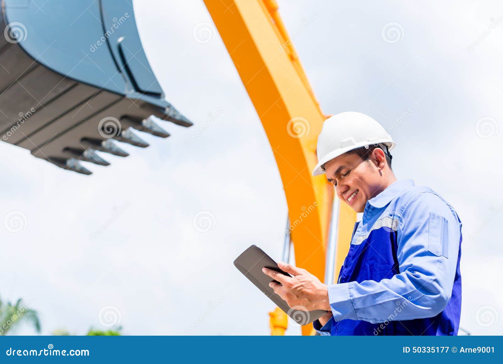 Engineer Checking Plans on Construction Site Stock Image - Image of ...