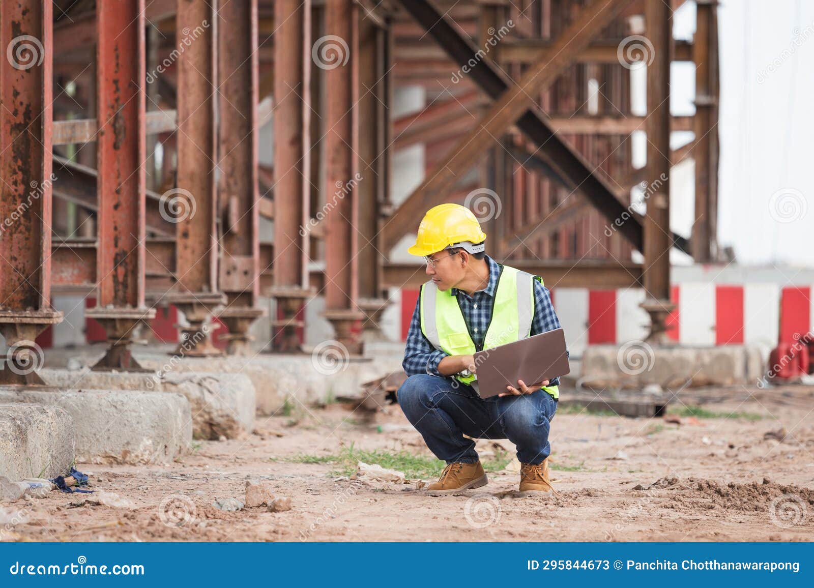 Engineer Checking Project at the Building Site, Man in Hardhat with ...
