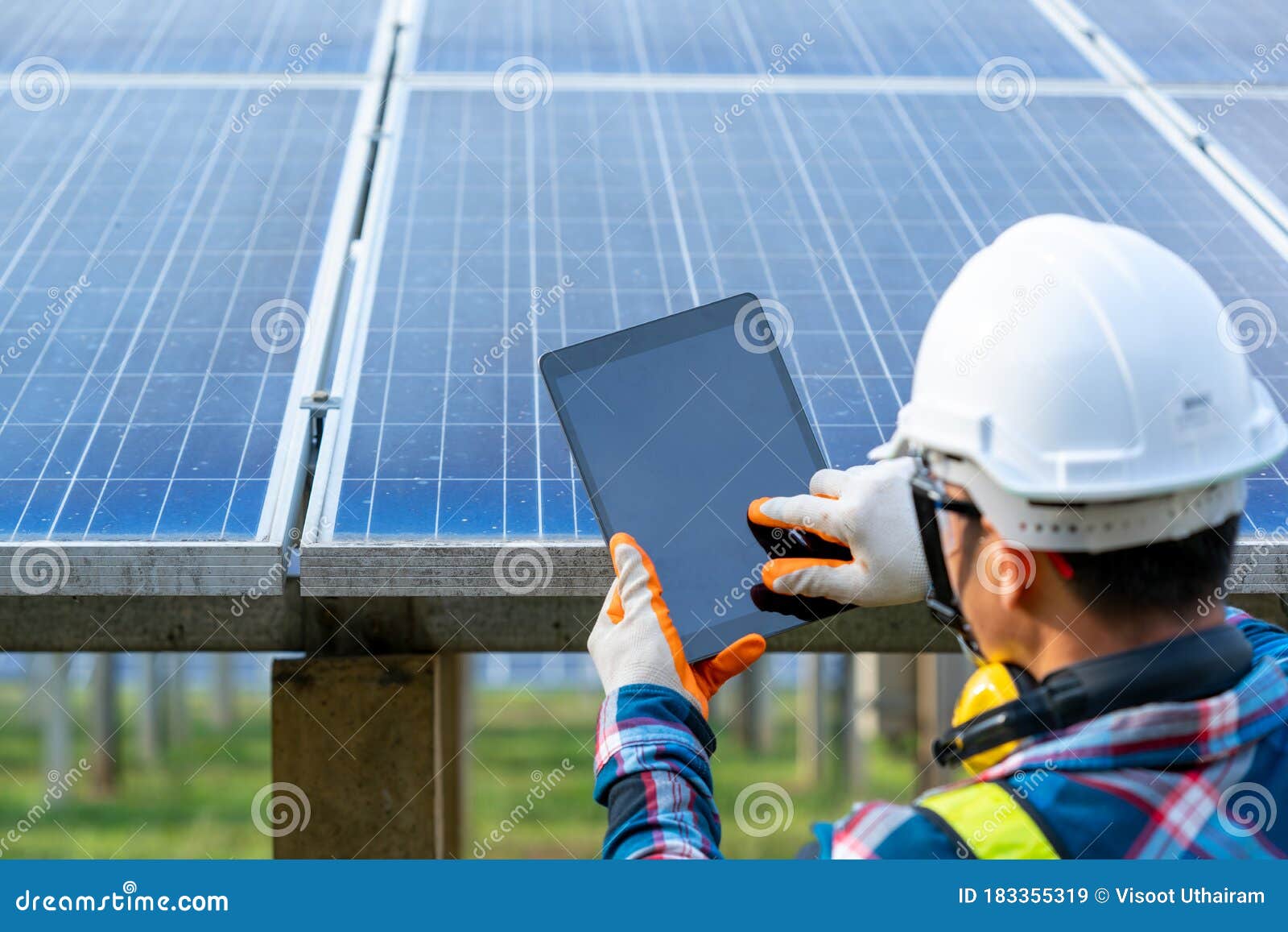 Engineer Checking Solar Panel in Routine Operation at Solar Power Plant ...