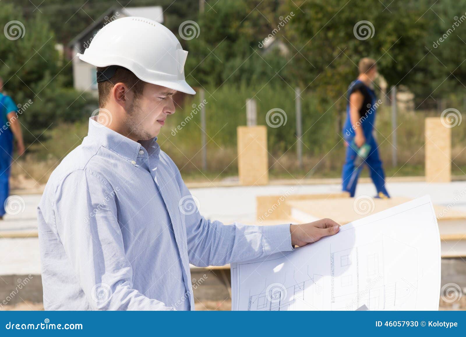 Engineer Checking Specifications on a Plan Stock Photo - Image of ...