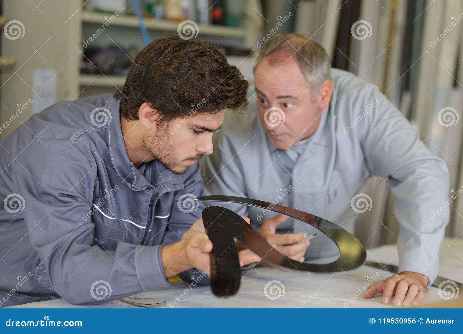 Engineer Checking Trainees Work on Factory Floor Stock Photo - Image of ...