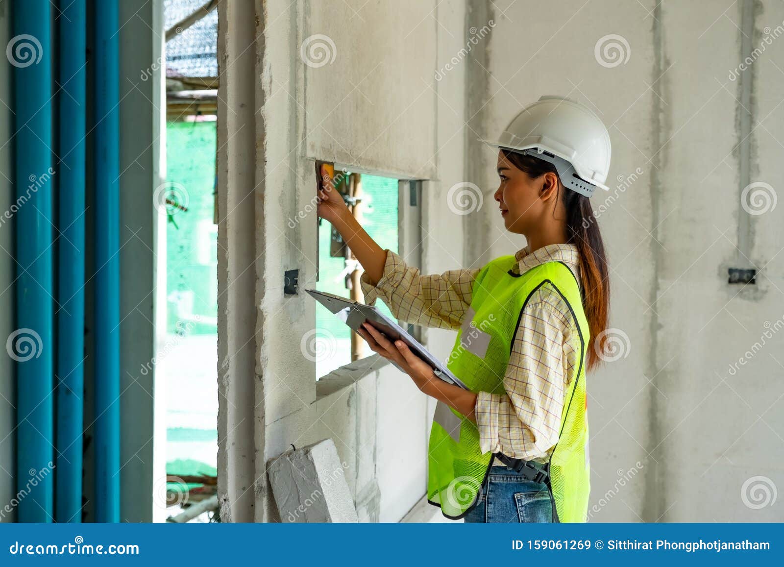 Engineer is Checking Wall Level in Building Site Stock Image - Image of ...