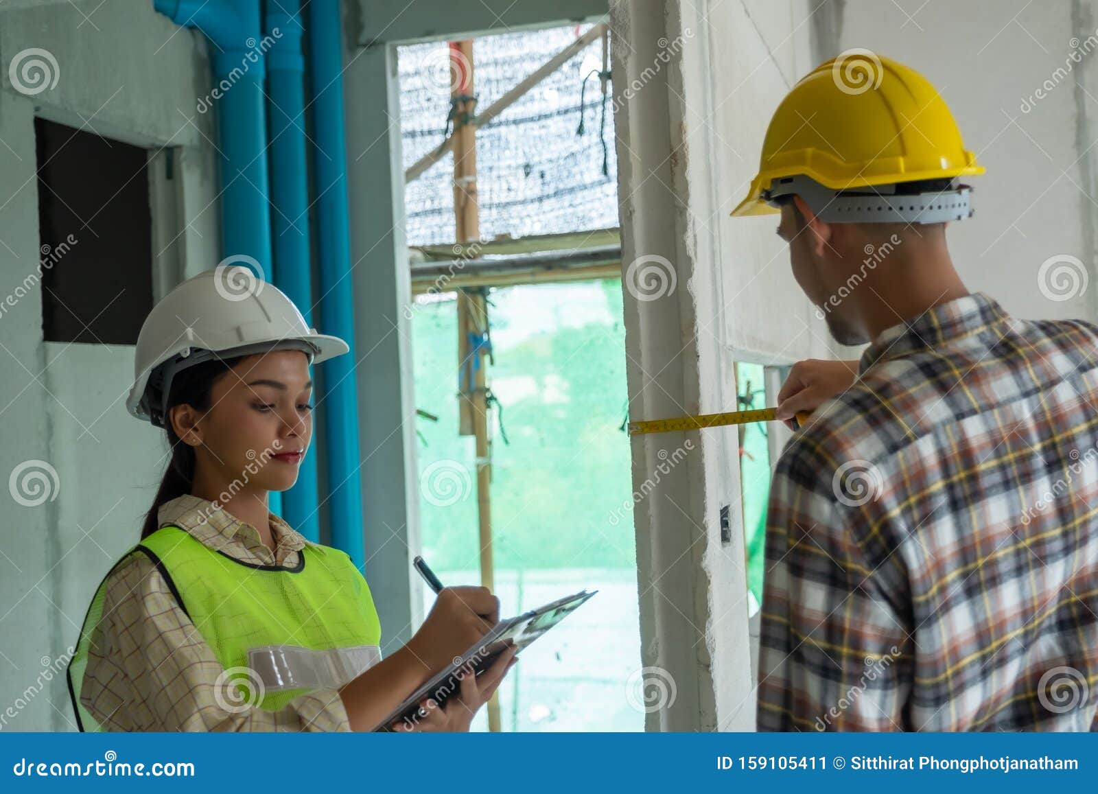 Engineer is Checking Wall Level in Building Site Stock Image - Image of ...