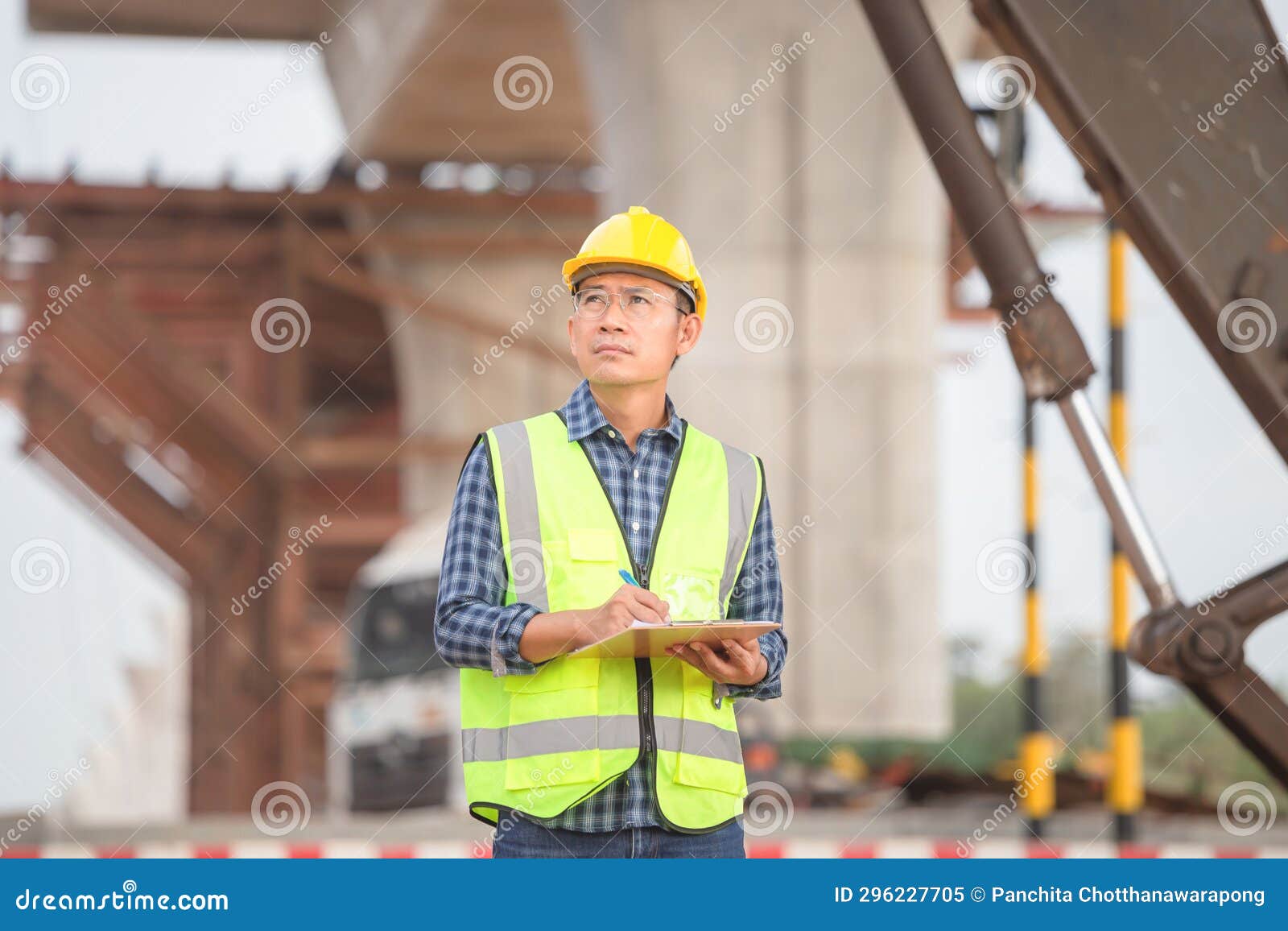 Engineer with Clipboard Checklist, Industrial Worker at Infrastructure ...