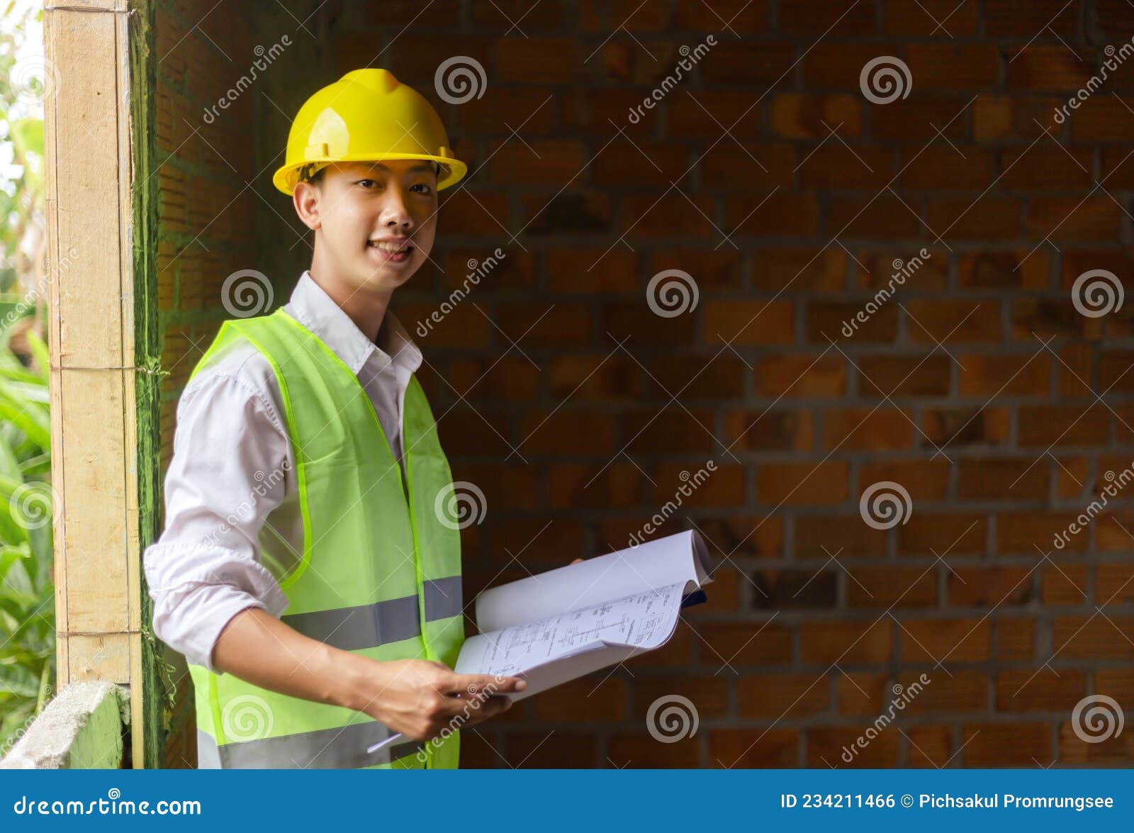 Engineer Concept the Male Head Builder Leaning Himself at the Window ...