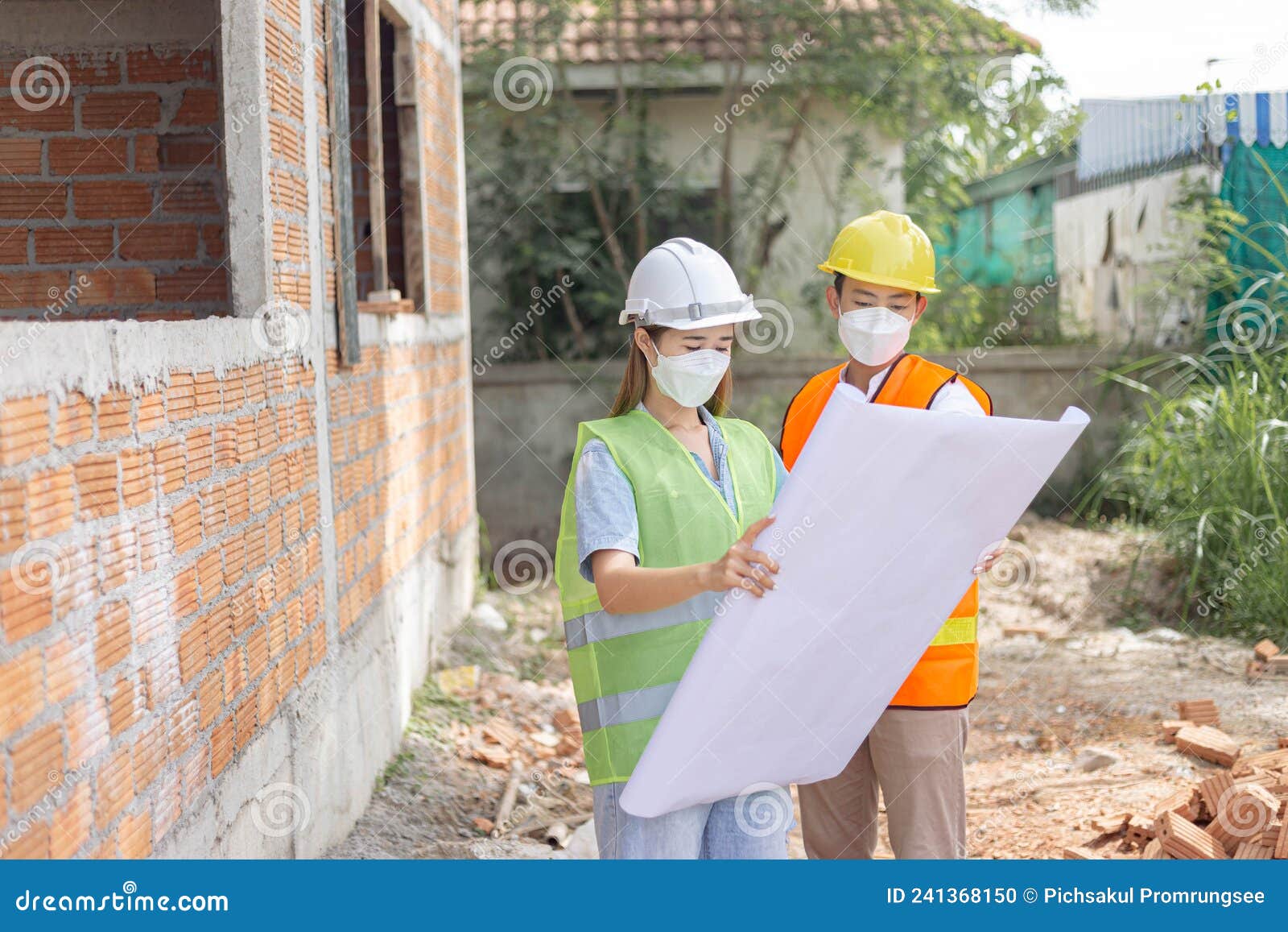 Engineer Concept the Two Building Directors with a Helmet and a Mask ...
