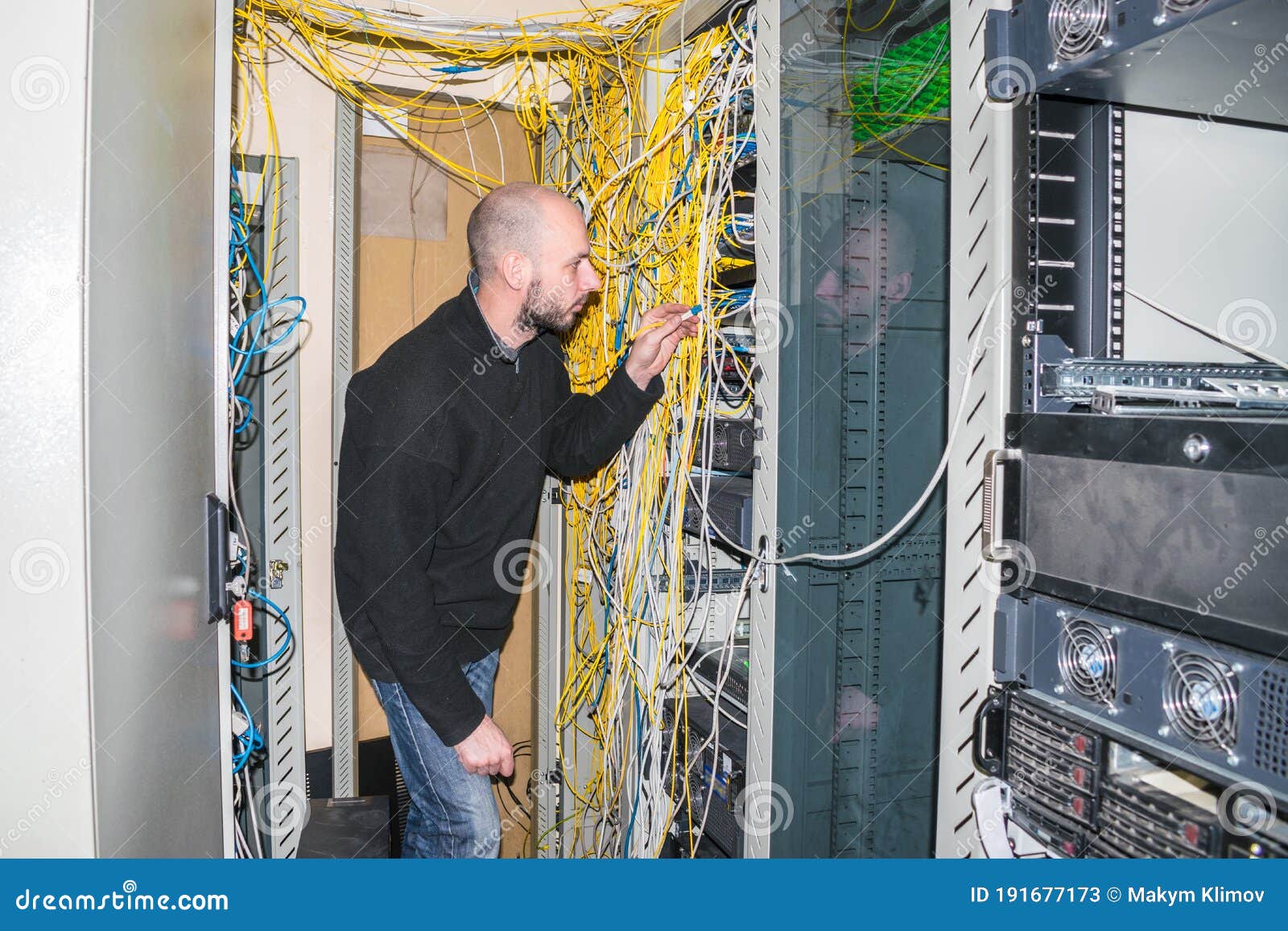 The Engineer Connects the Optical Wire To the Central Router. the ...