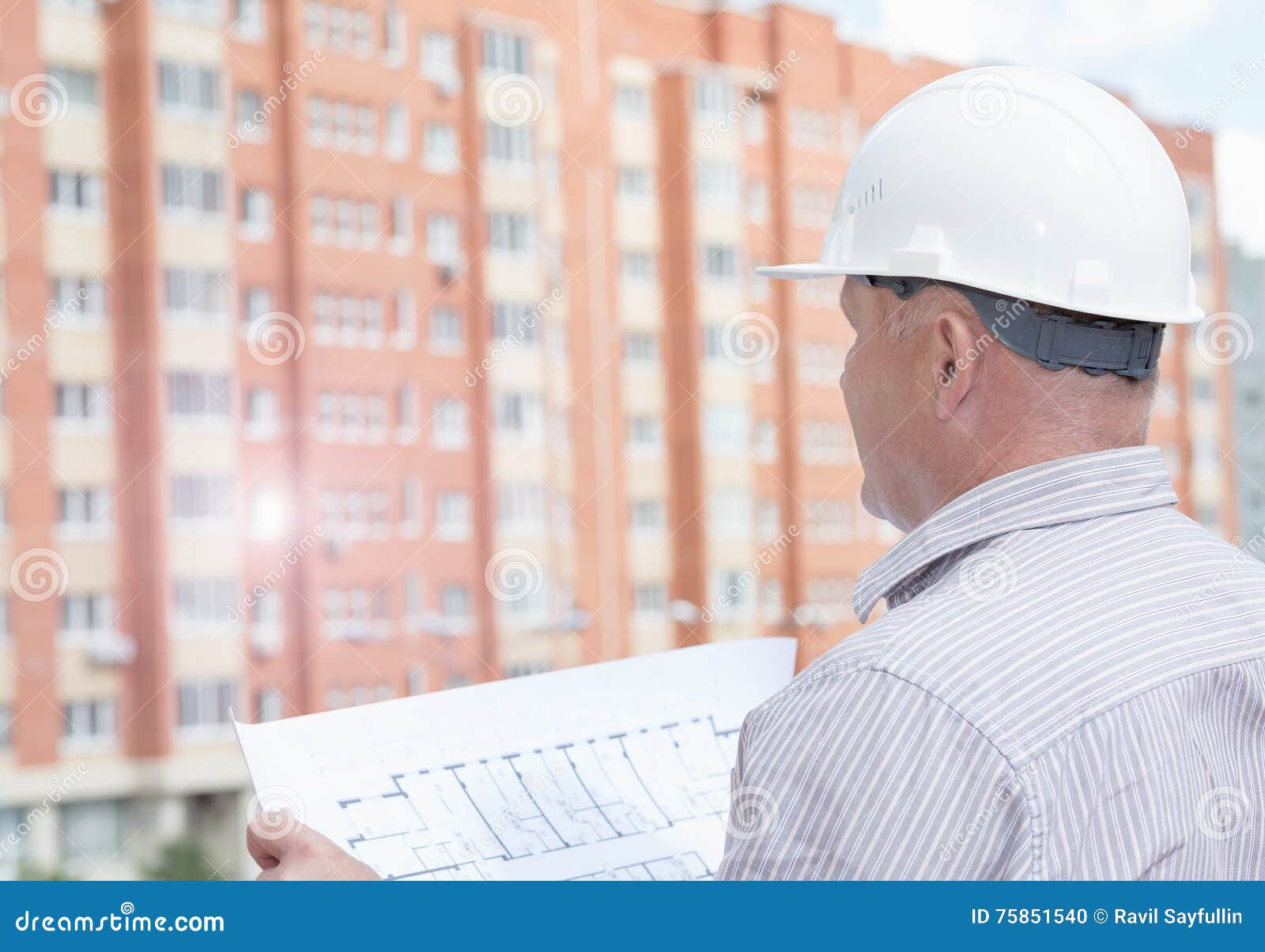 An Engineer with Construction Plans Stock Photo - Image of manager ...
