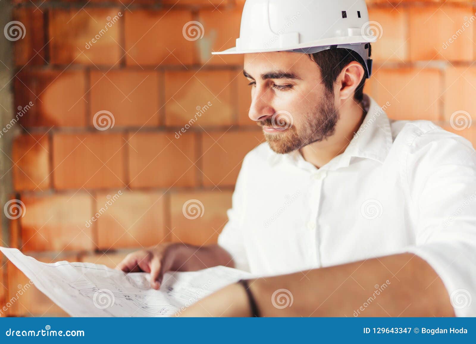 Engineer on Construction Site on Brick Wall Stock Image - Image of ...