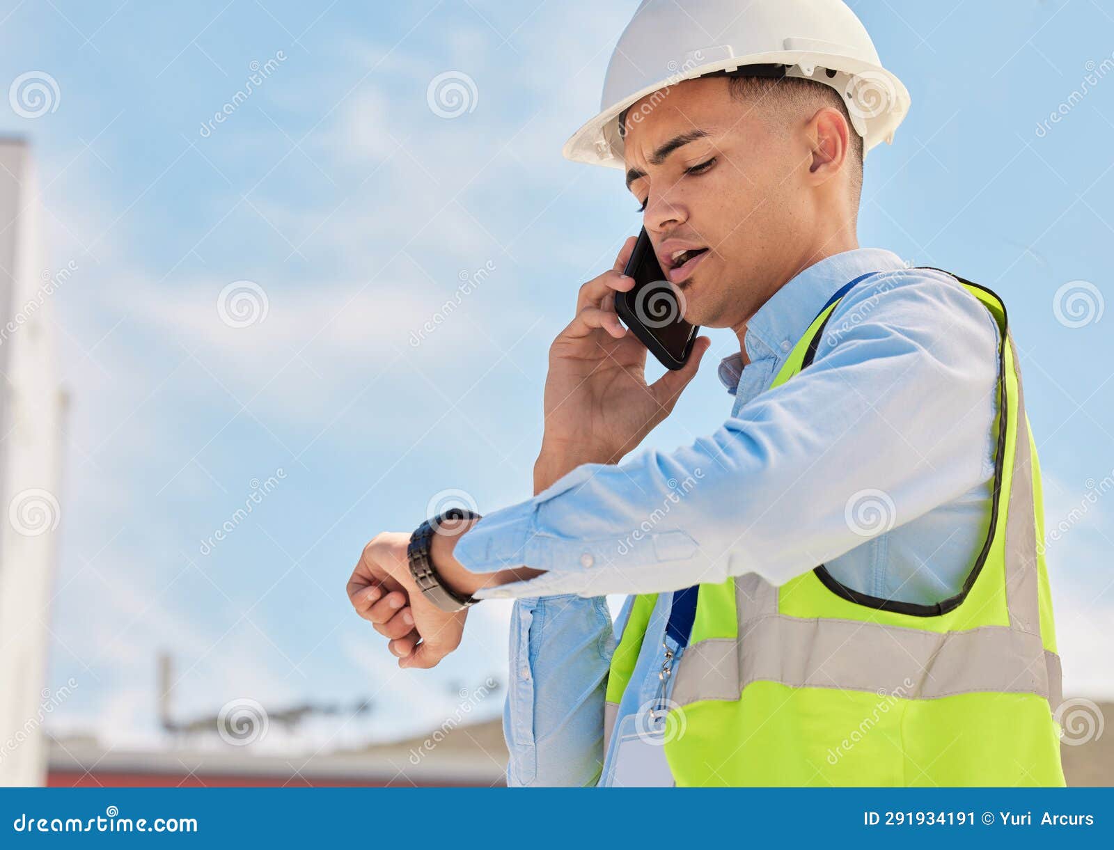 Engineer on Construction Site, Phone Call and Checking Time for ...